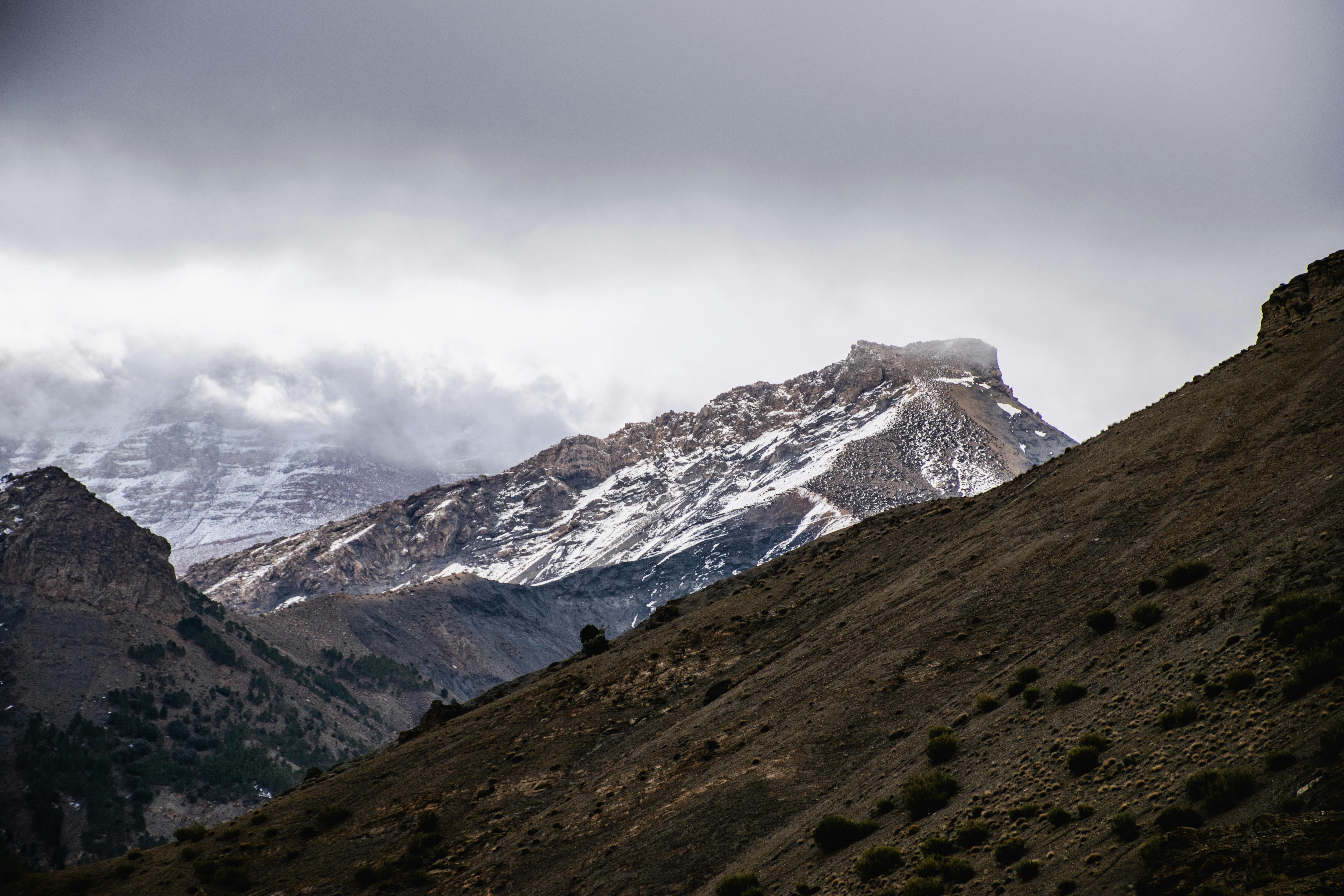Dramatic Snow-Capped Mountain Landscape · Free Stock Photo