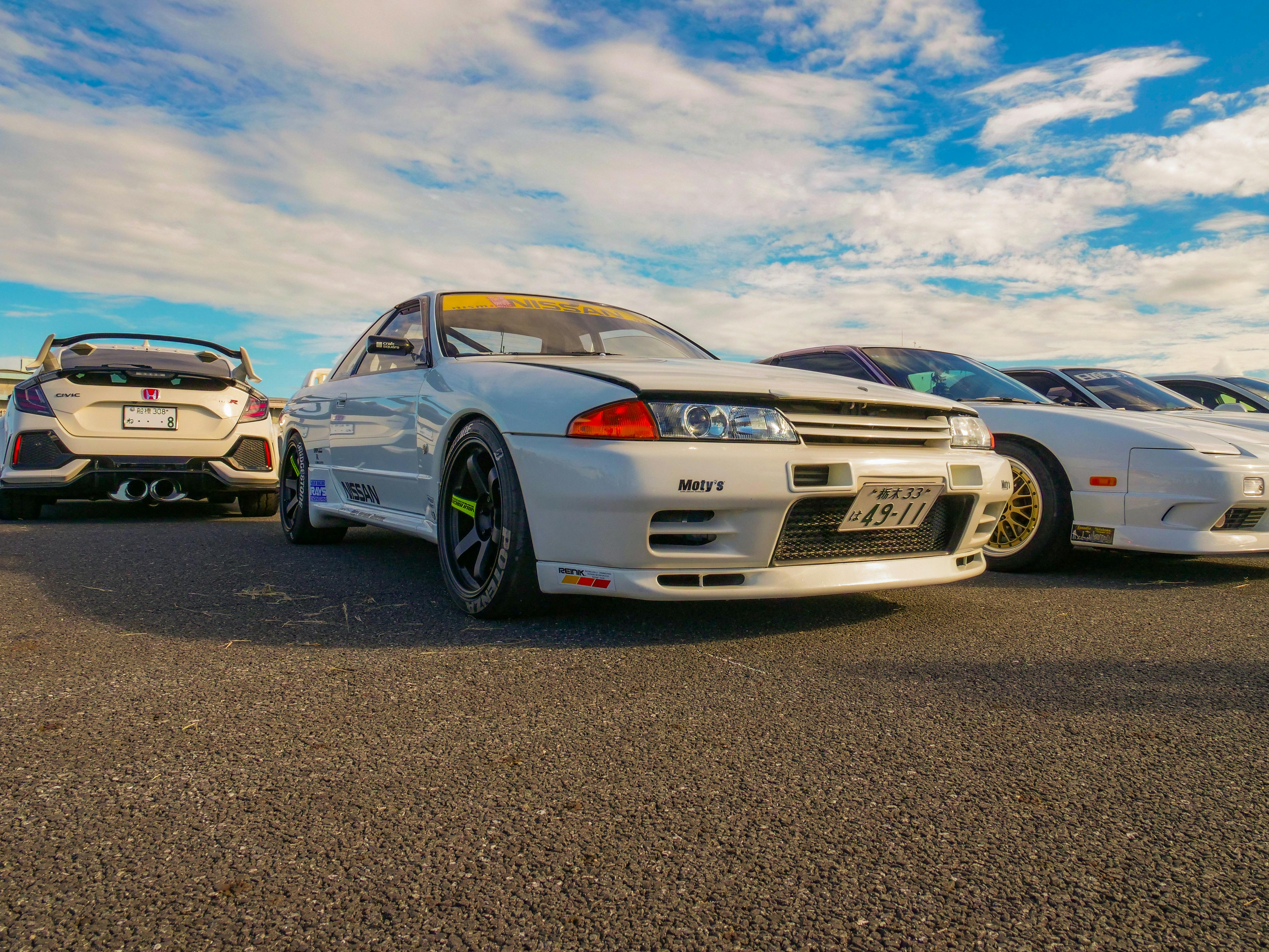 JDM Car Meet Featuring Nissan Skyline and Honda Civic · Free Stock Photo