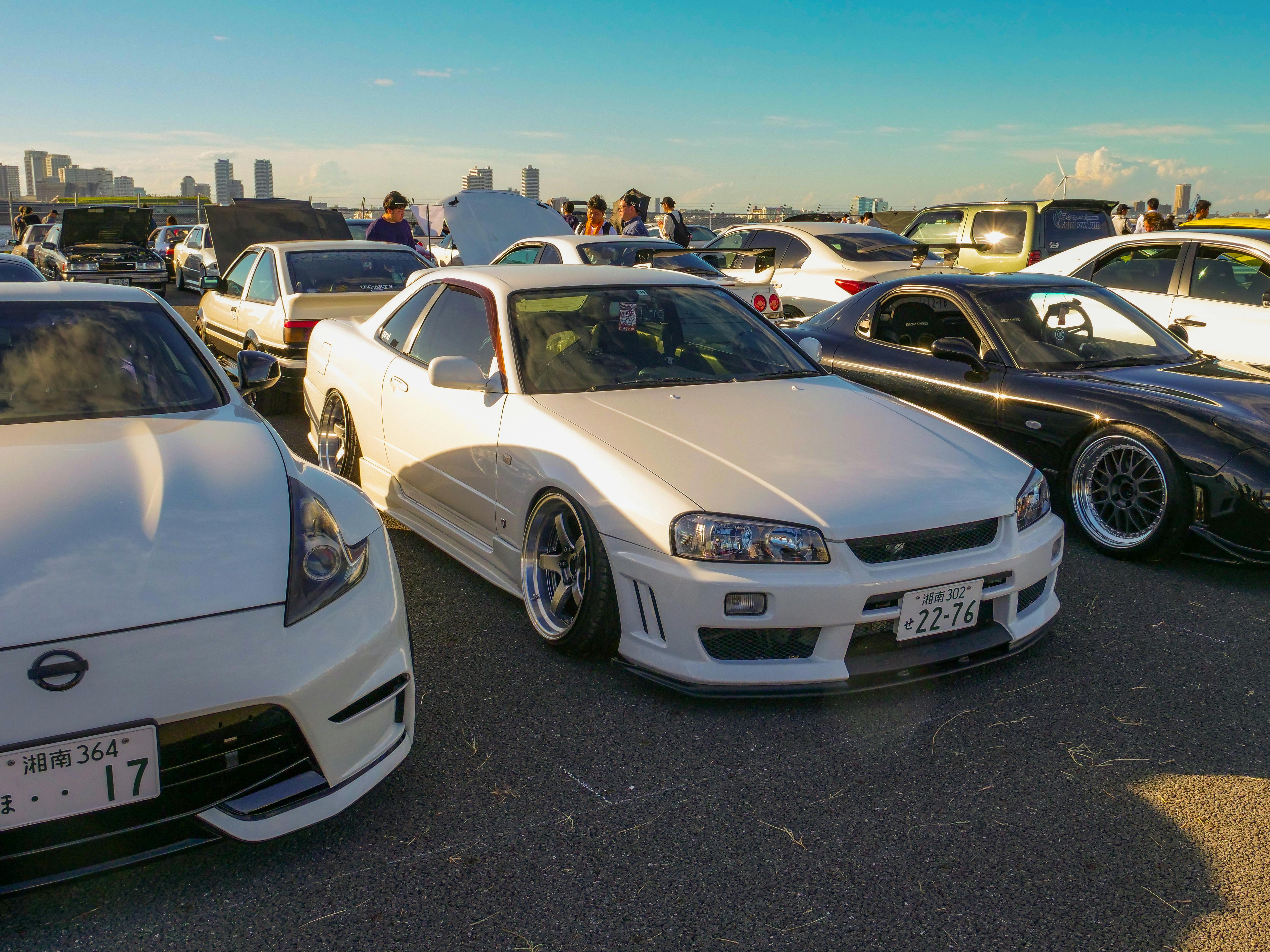 Vibrant JDM Car Meet Showcasing Modified Vehicles · Free Stock Photo