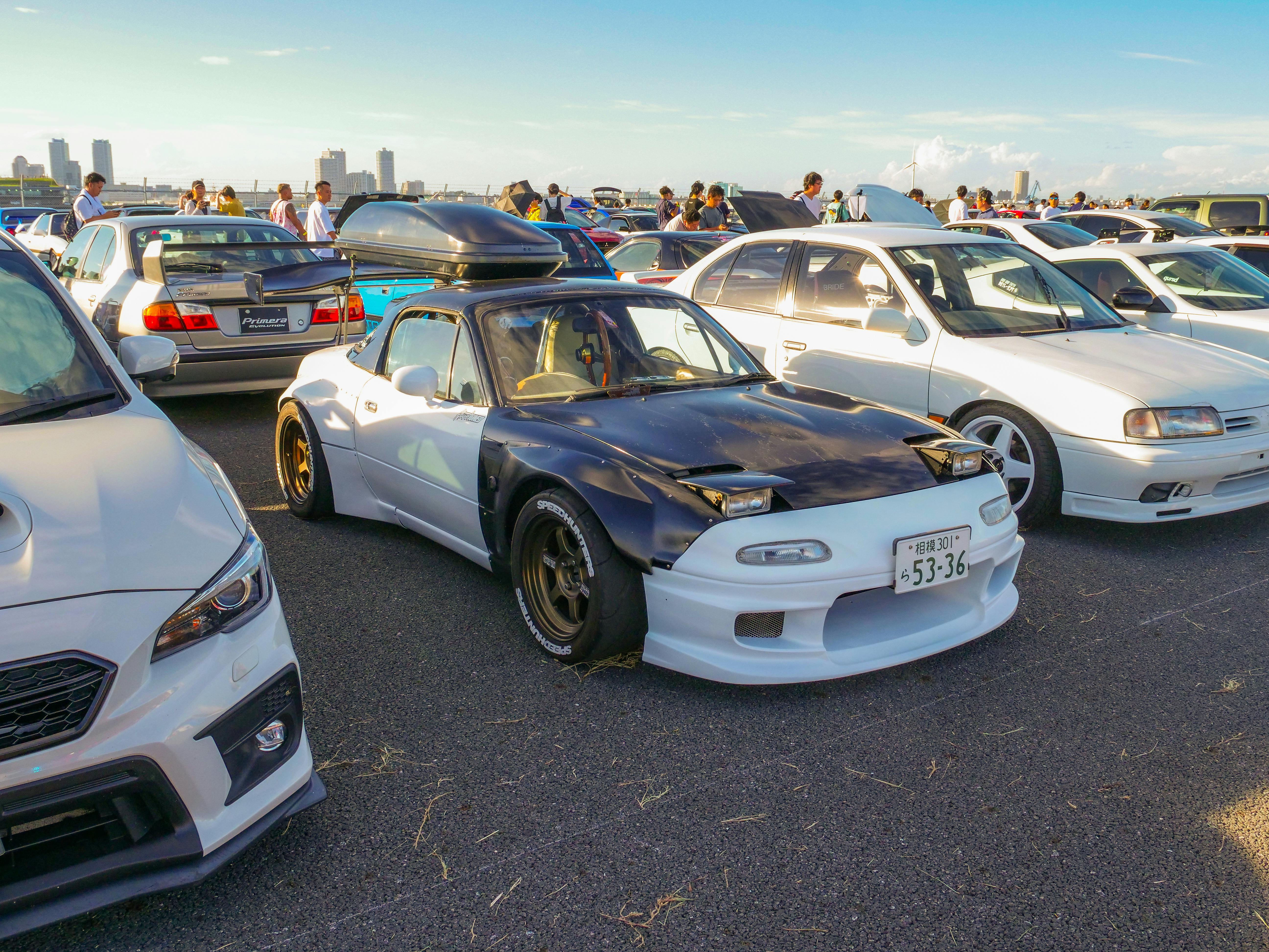 Vibrant JDM Car Meet Showcasing Modified Vehicles · Free Stock Photo