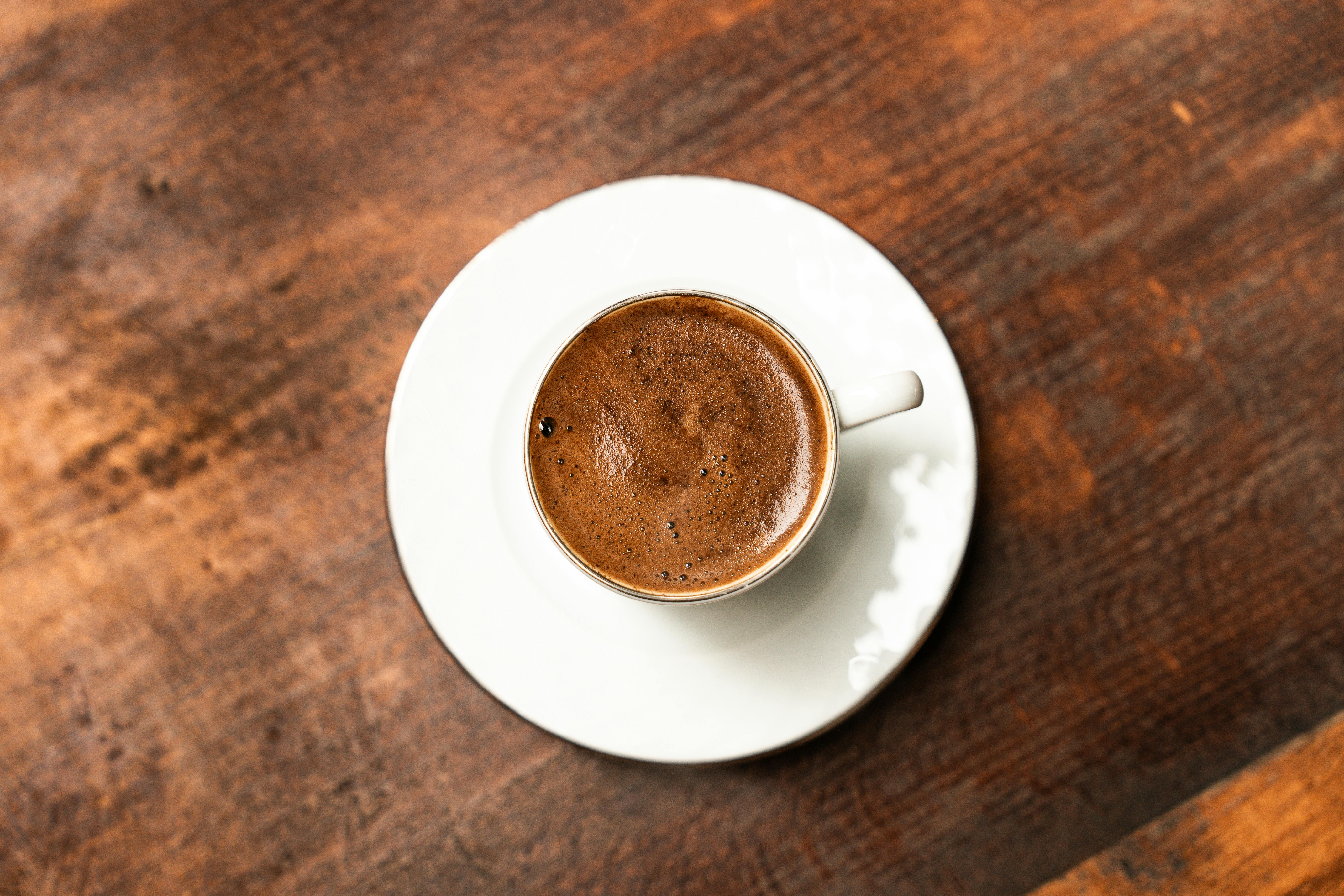 Top View of Espresso Coffee on Rustic Table · Free Stock Photo