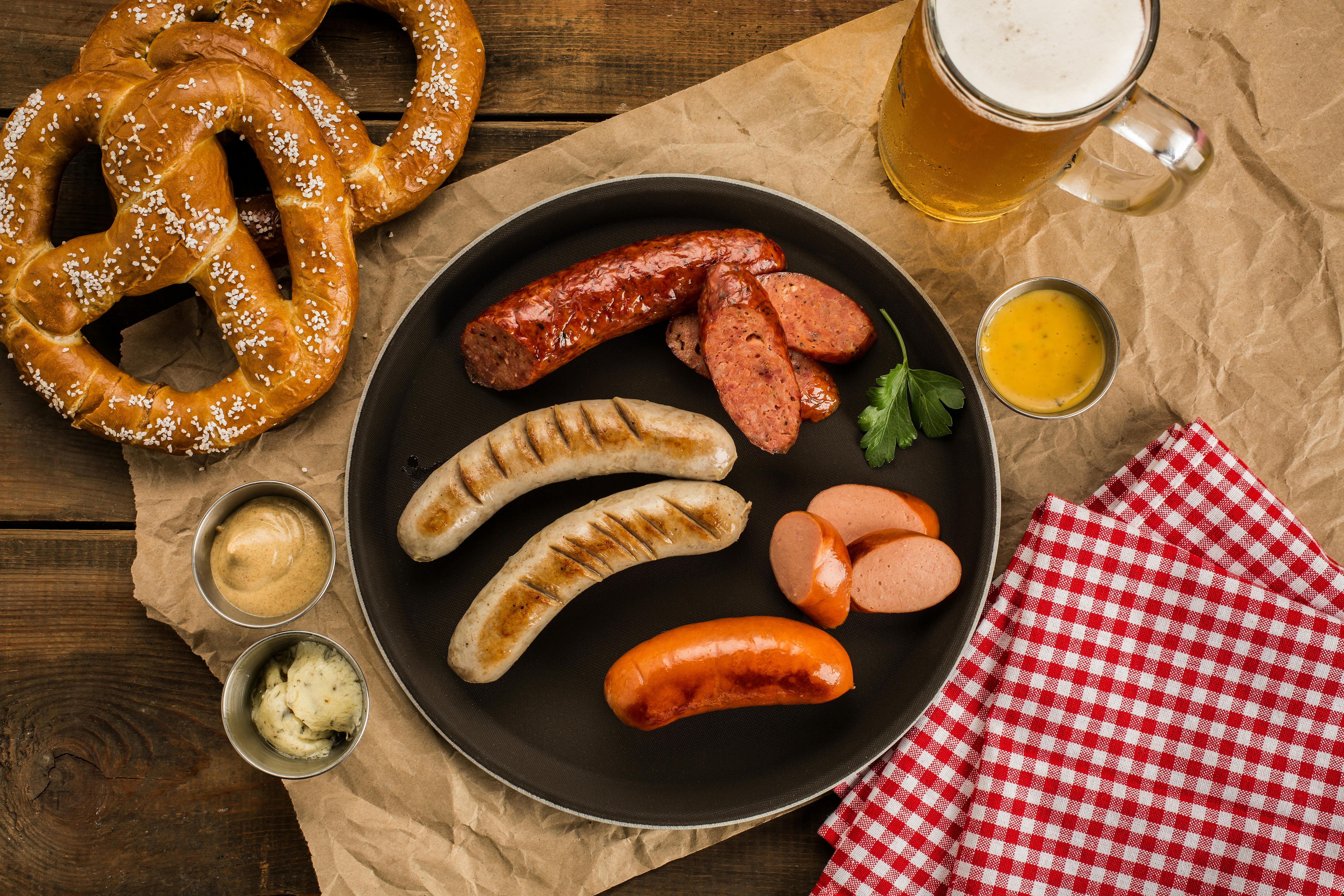 Authentic German Sausages with Pretzels and Beer · Free Stock Photo
