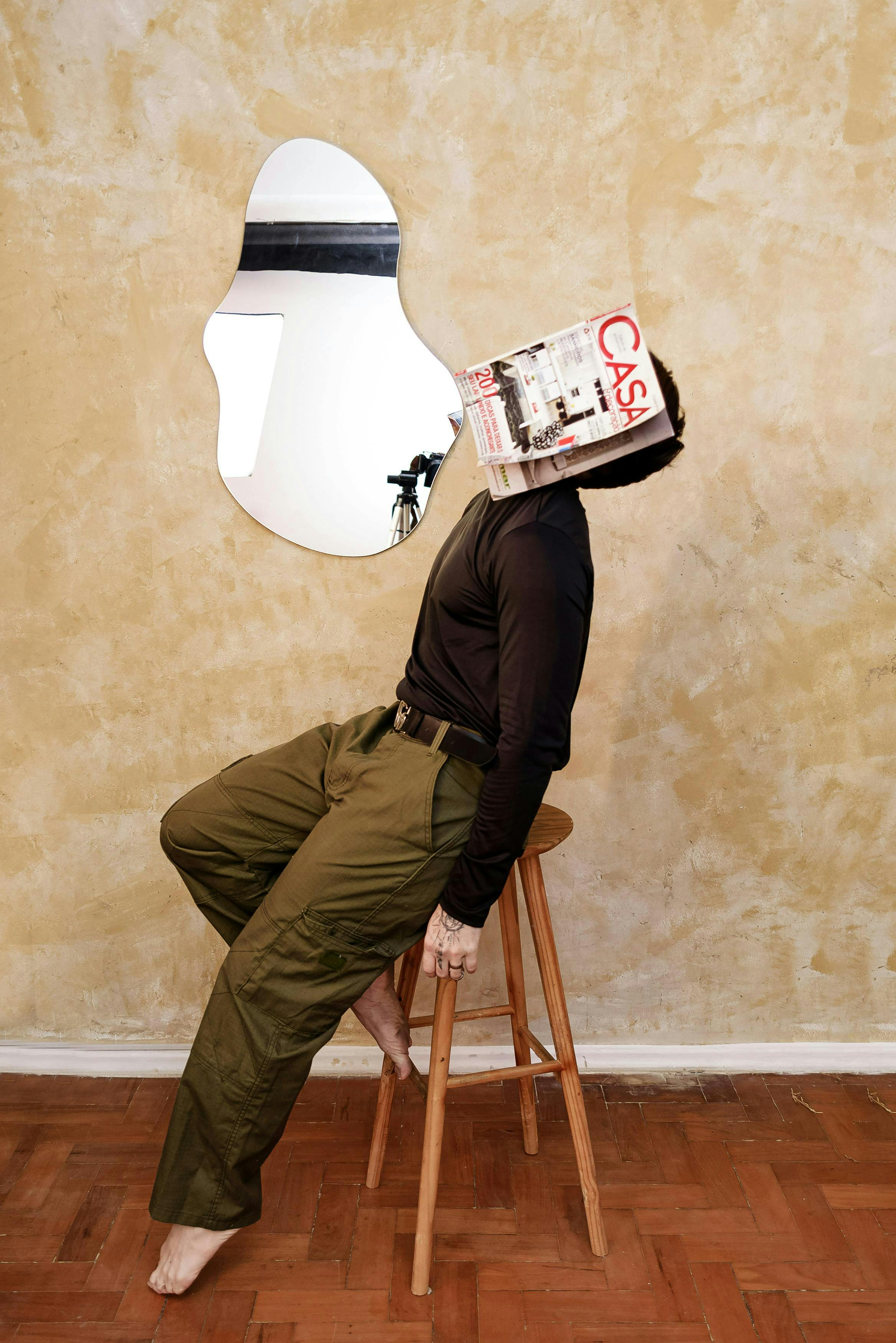 Artistic Portrait with Magazine Concealing Face · Free Stock Photo