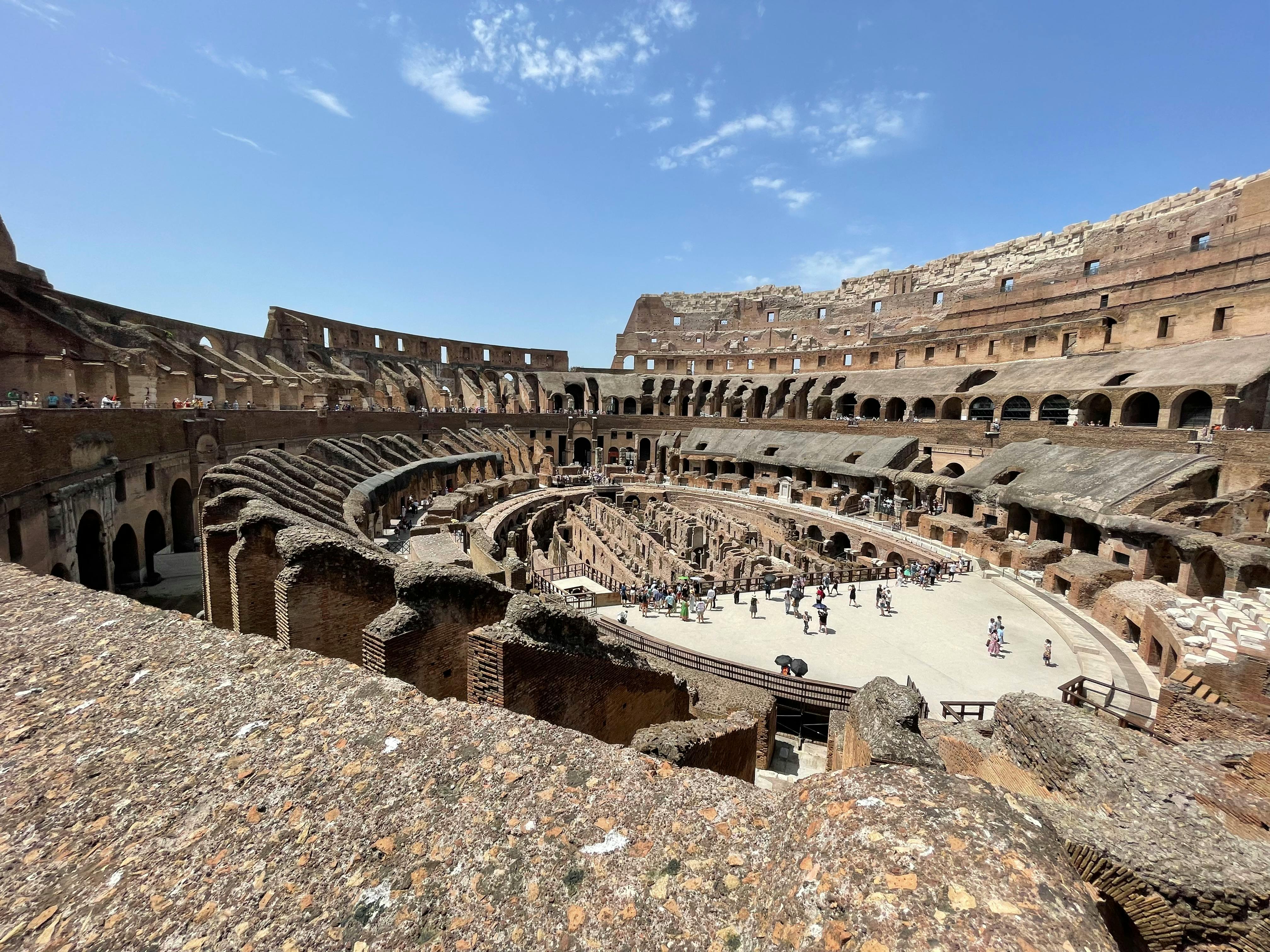 Exploring the Ancient Rome Colosseum Interior · Free Stock Photo
