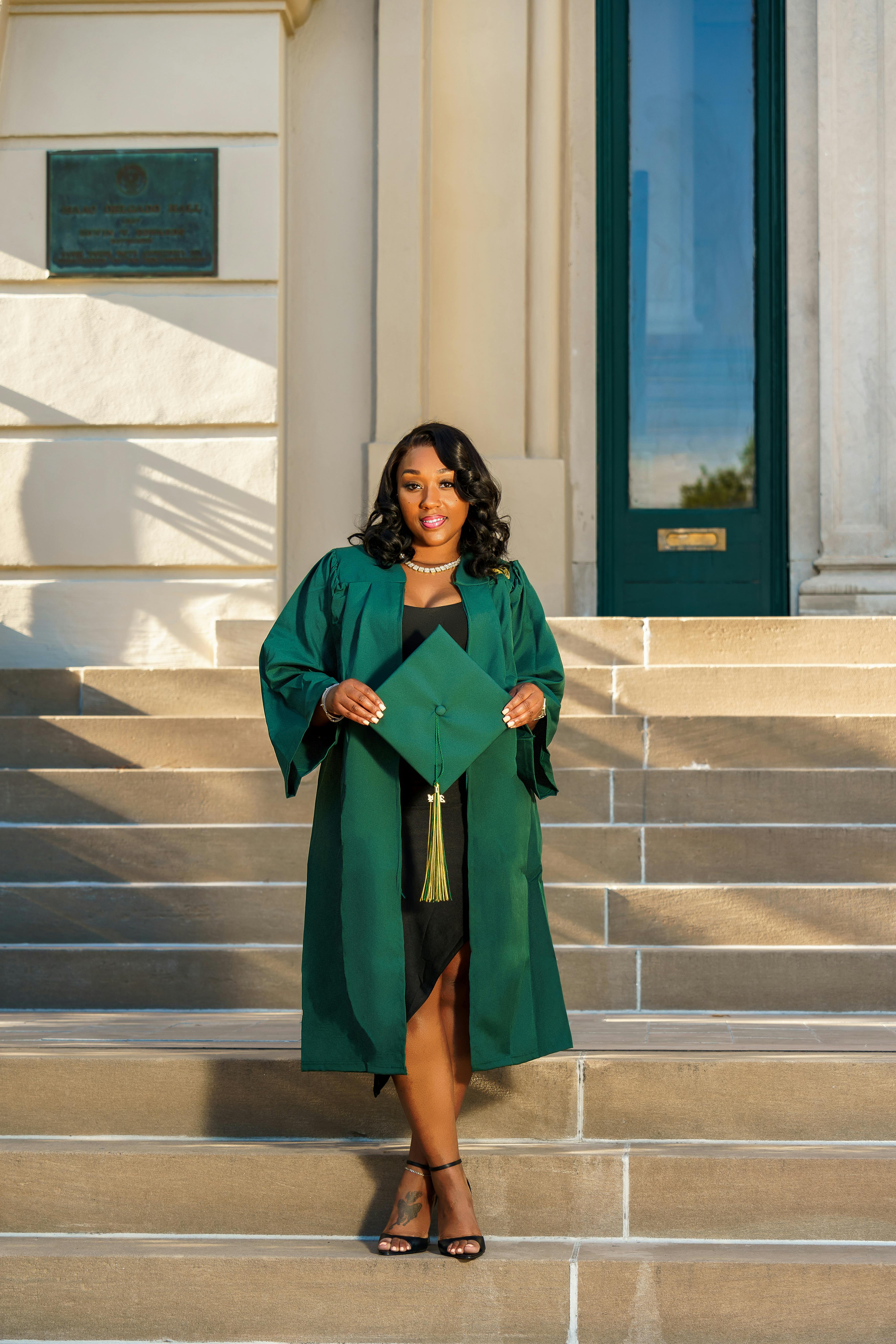 Green Graduation Cap And Gown