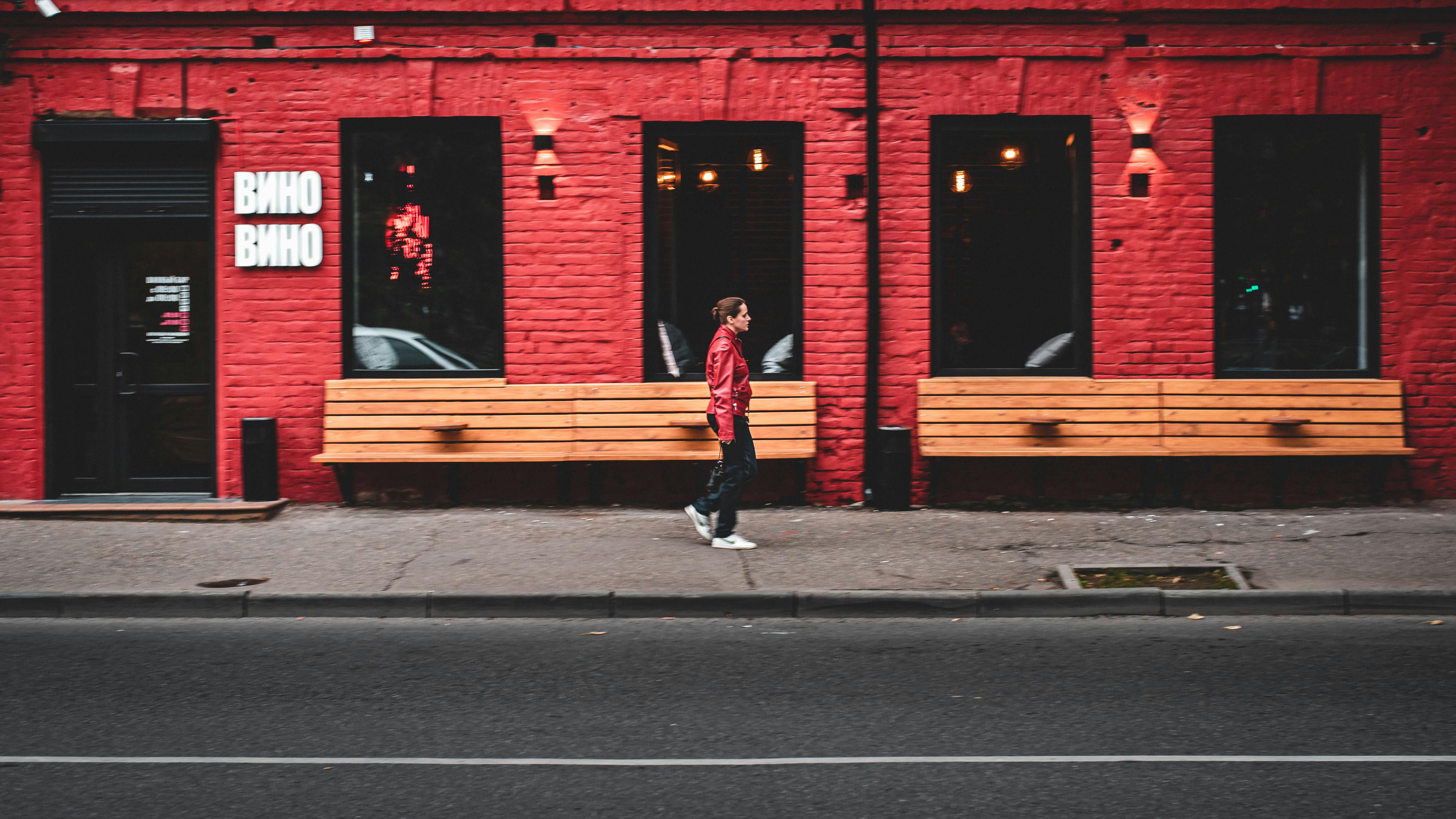 Woman walking on street in town · Free Stock Photo