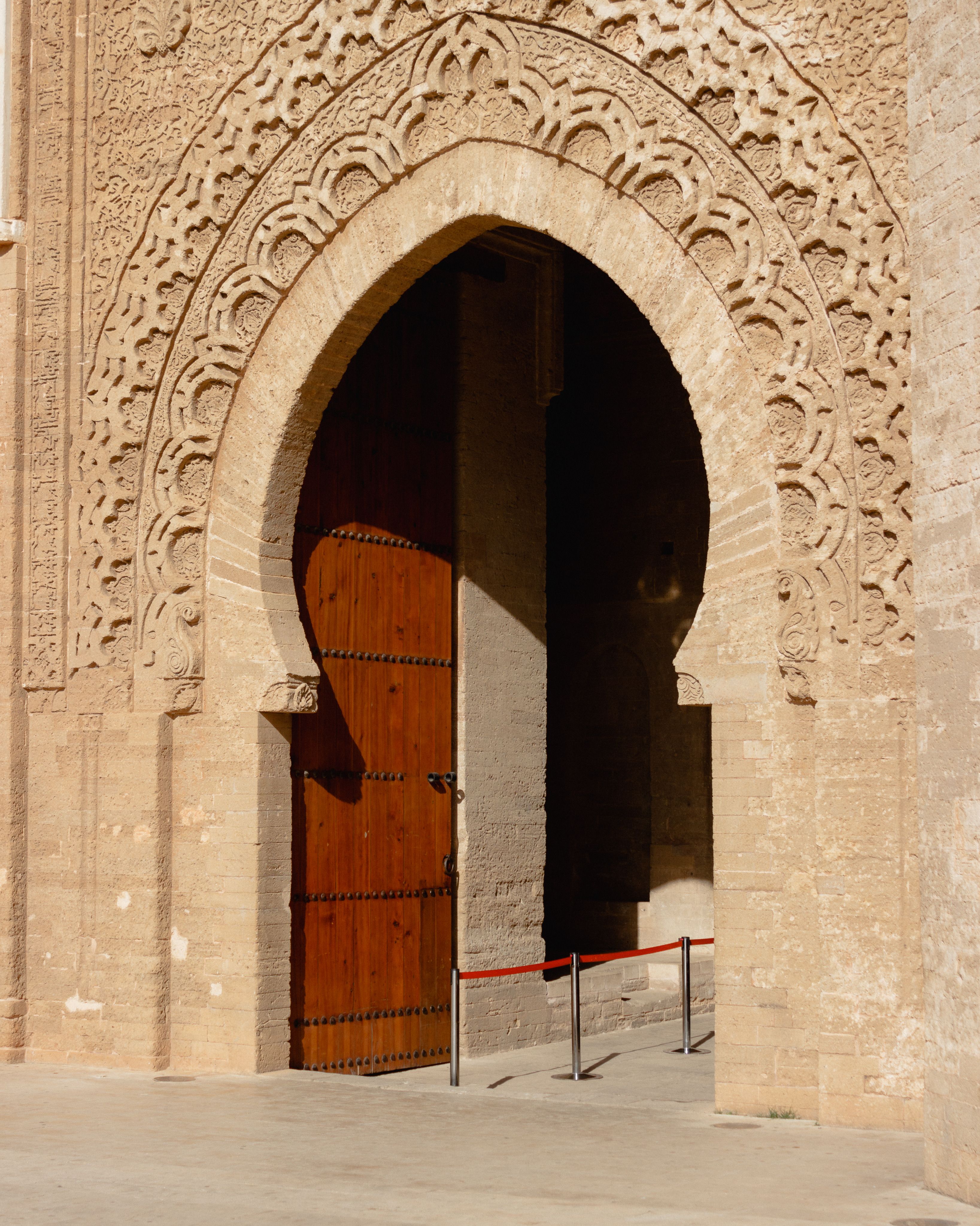 Intricate Moroccan Archway with Open Doorway · Free Stock Photo