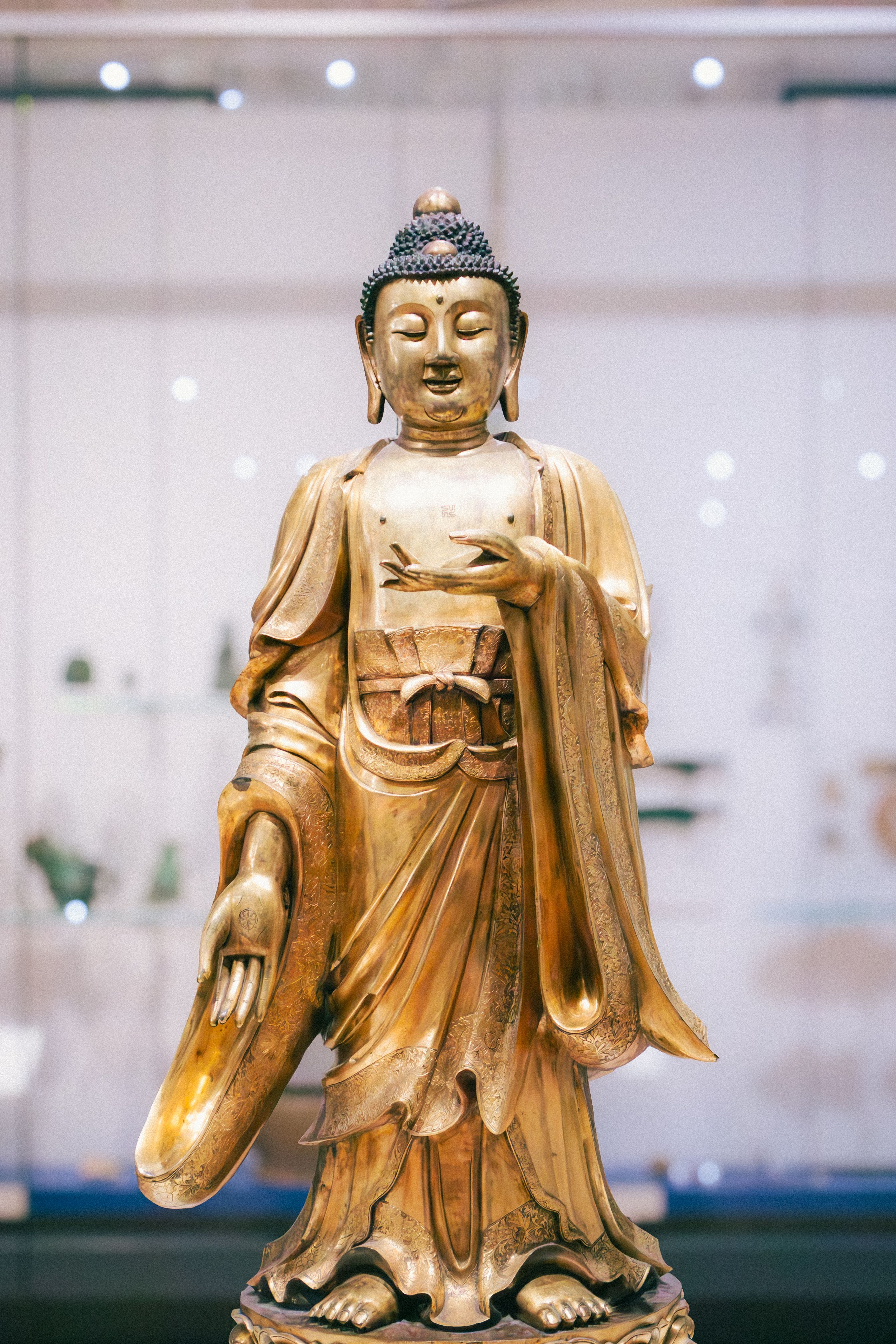 Golden Buddha Statue in Toronto Museum Exhibit · Free Stock Photo