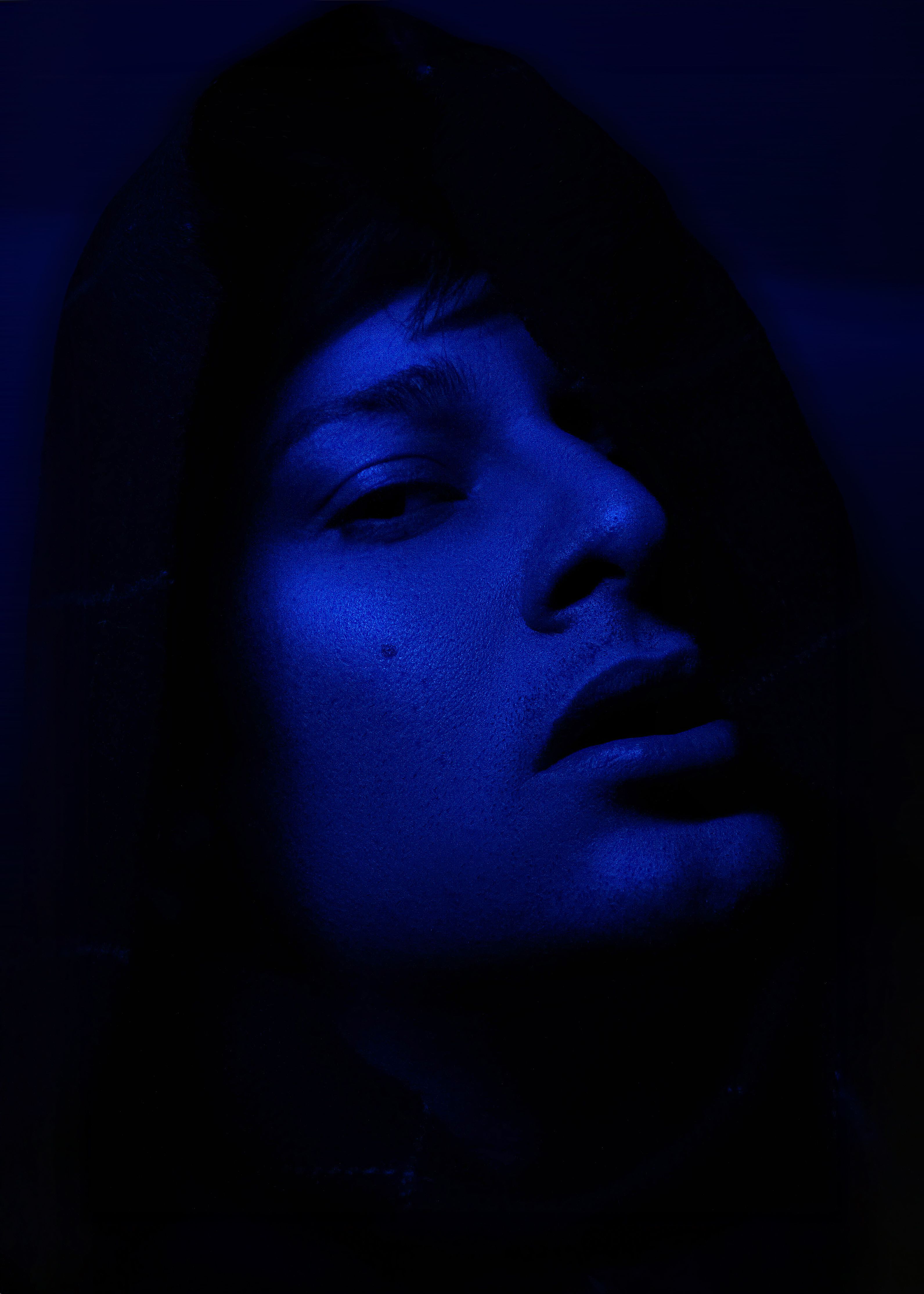 Dramatic Blue Portrait of Mysterious Figure · Free Stock Photo