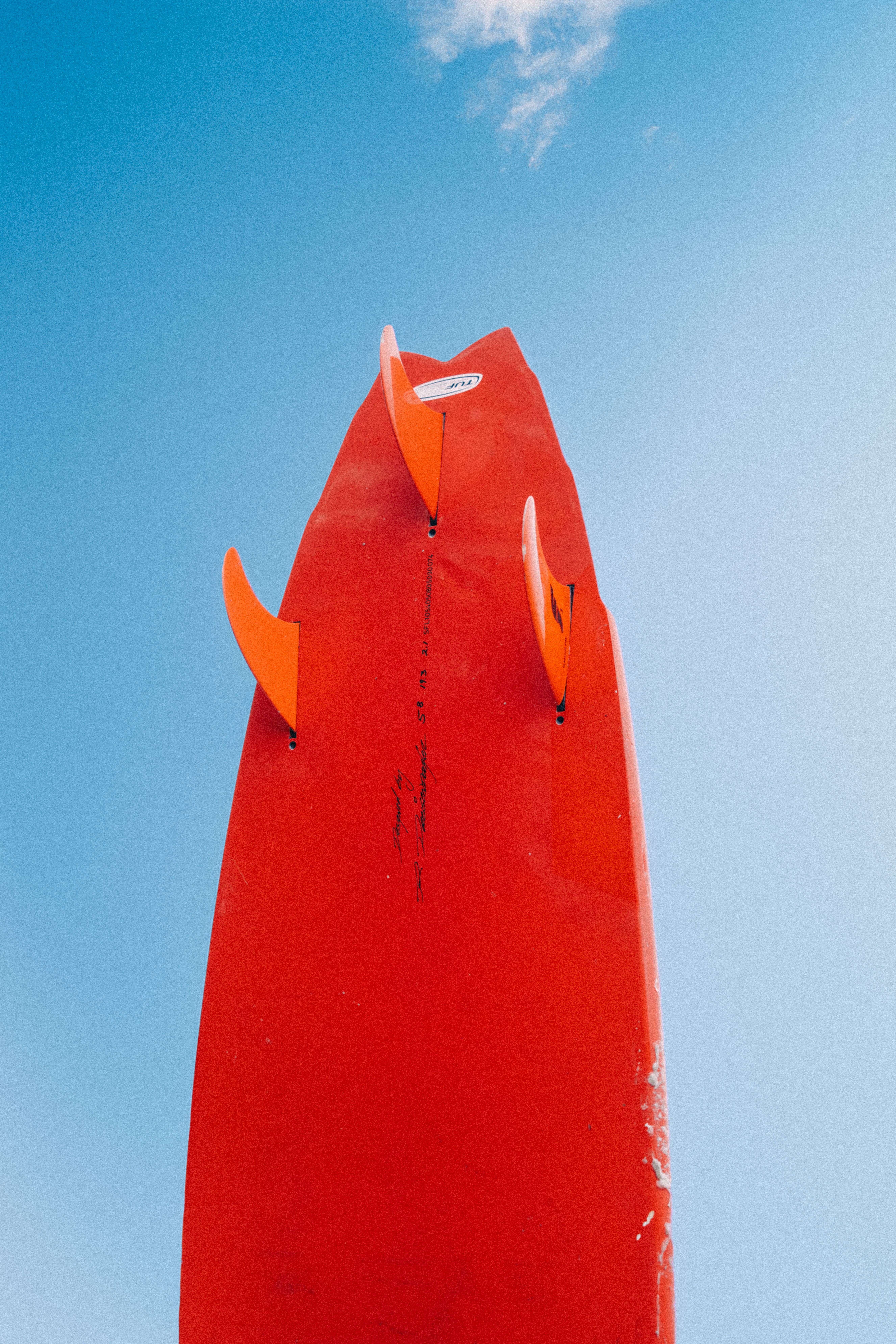 Red Surfboard Against Blue Tofino Sky · Free Stock Photo