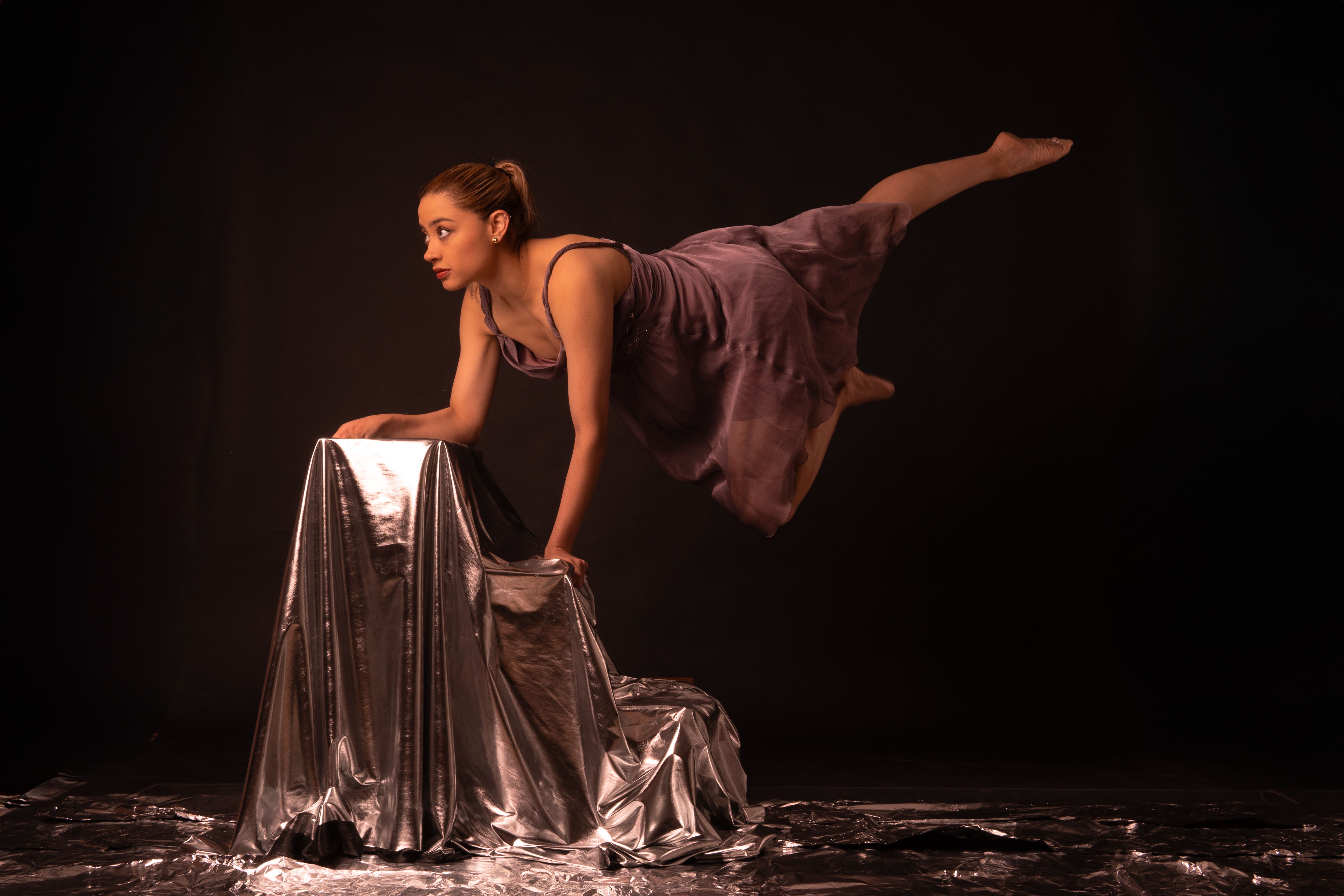 Dynamic Female Dancer in Mid-air Action Pose · Free Stock Photo