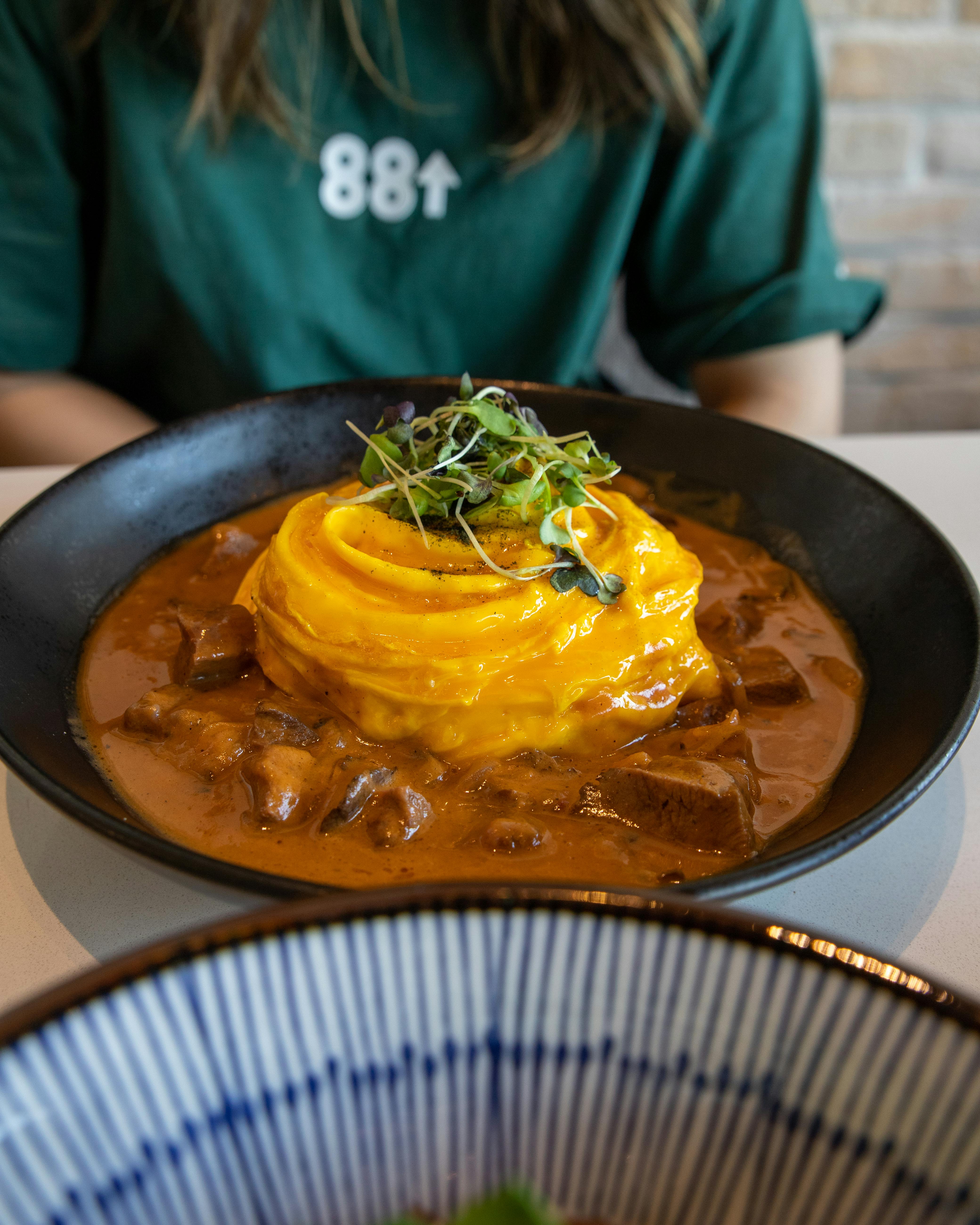 Delicious Japanese Curry with Omurice Dish · Free Stock Photo