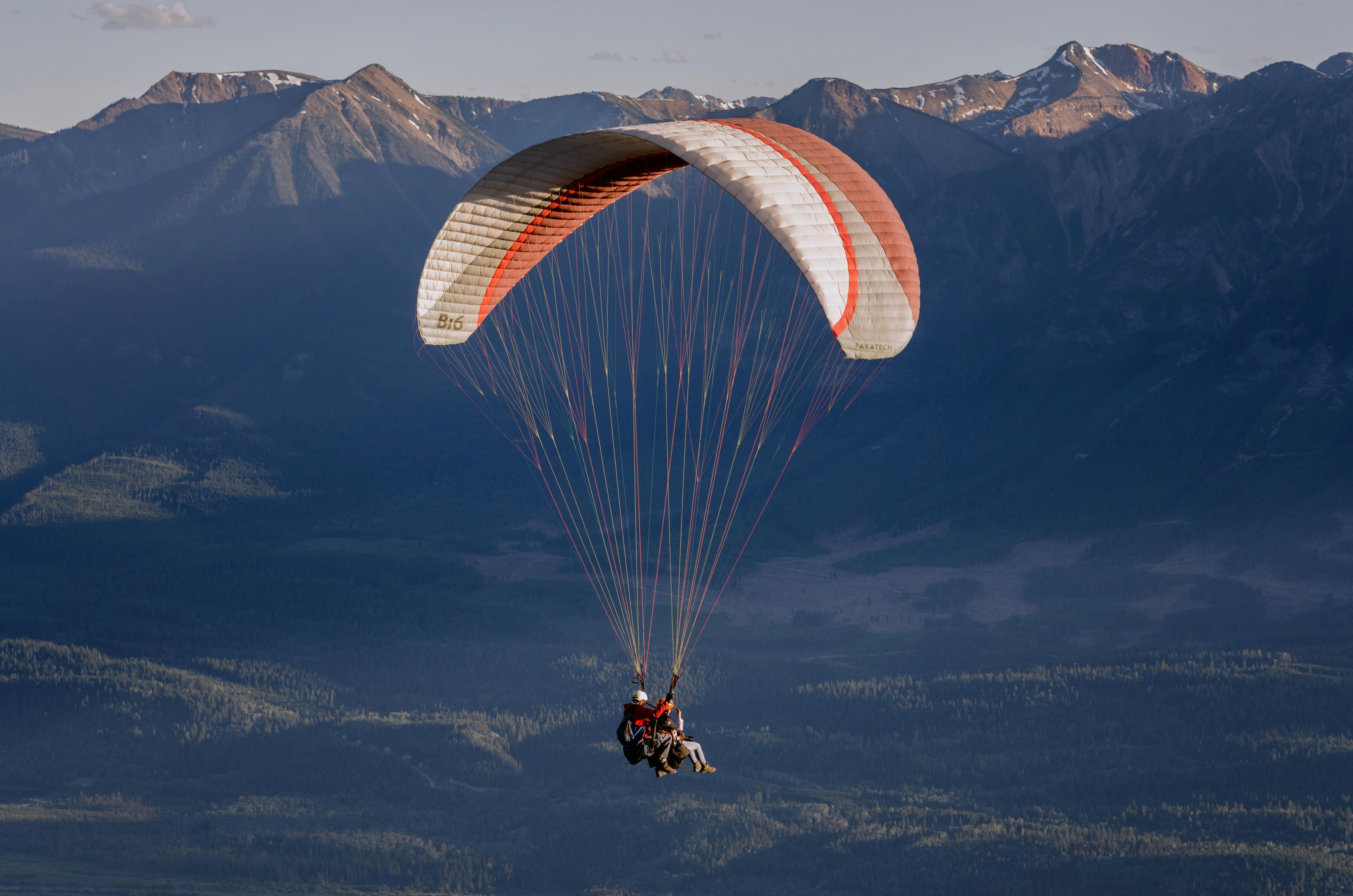 Low Angle View of Paragliding Against Sky · Free Stock Photo