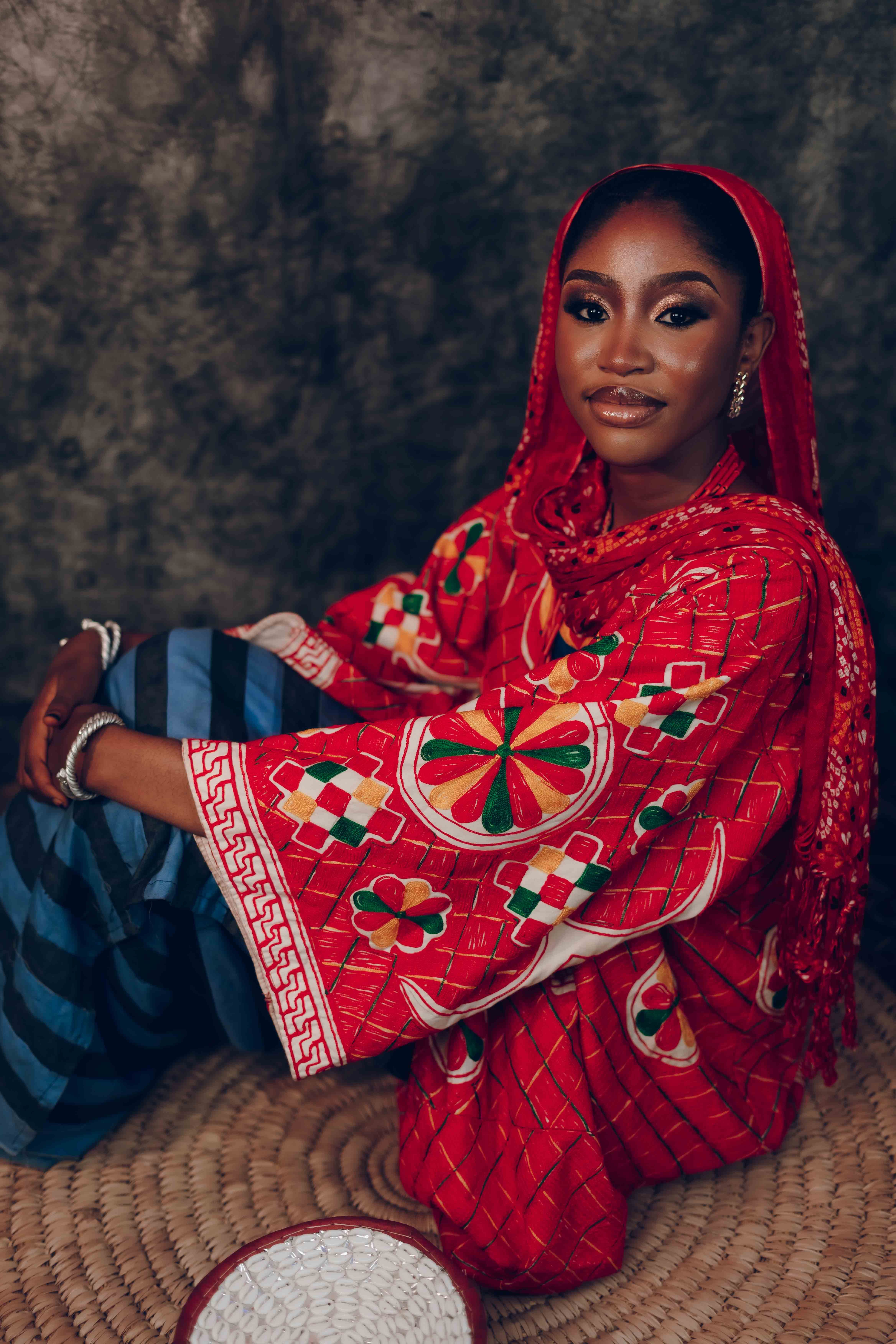 Woman in Colorful Traditional Attire · Free Stock Photo