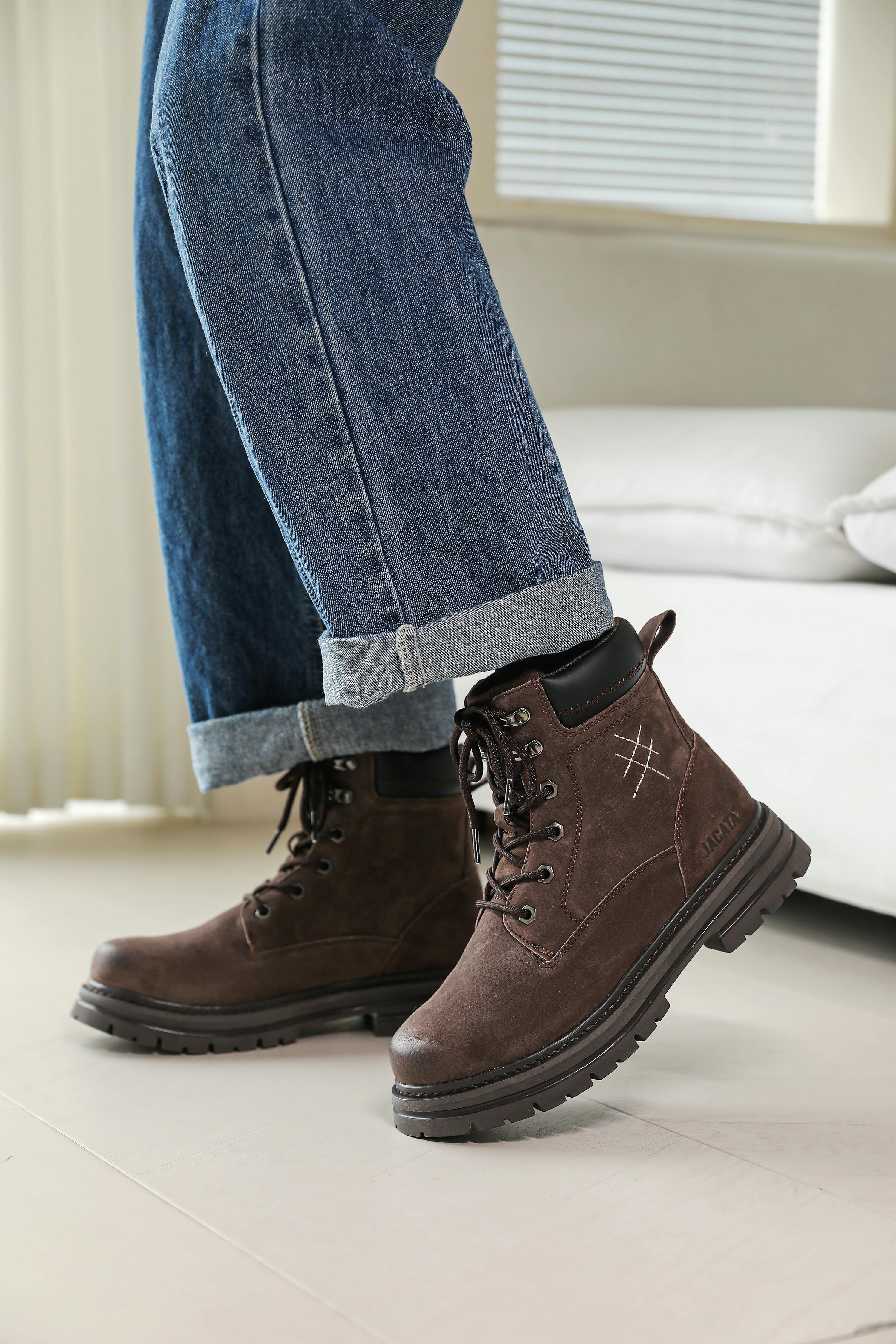 Stylish Brown Leather Boots in Indoor Setting · Free Stock Photo