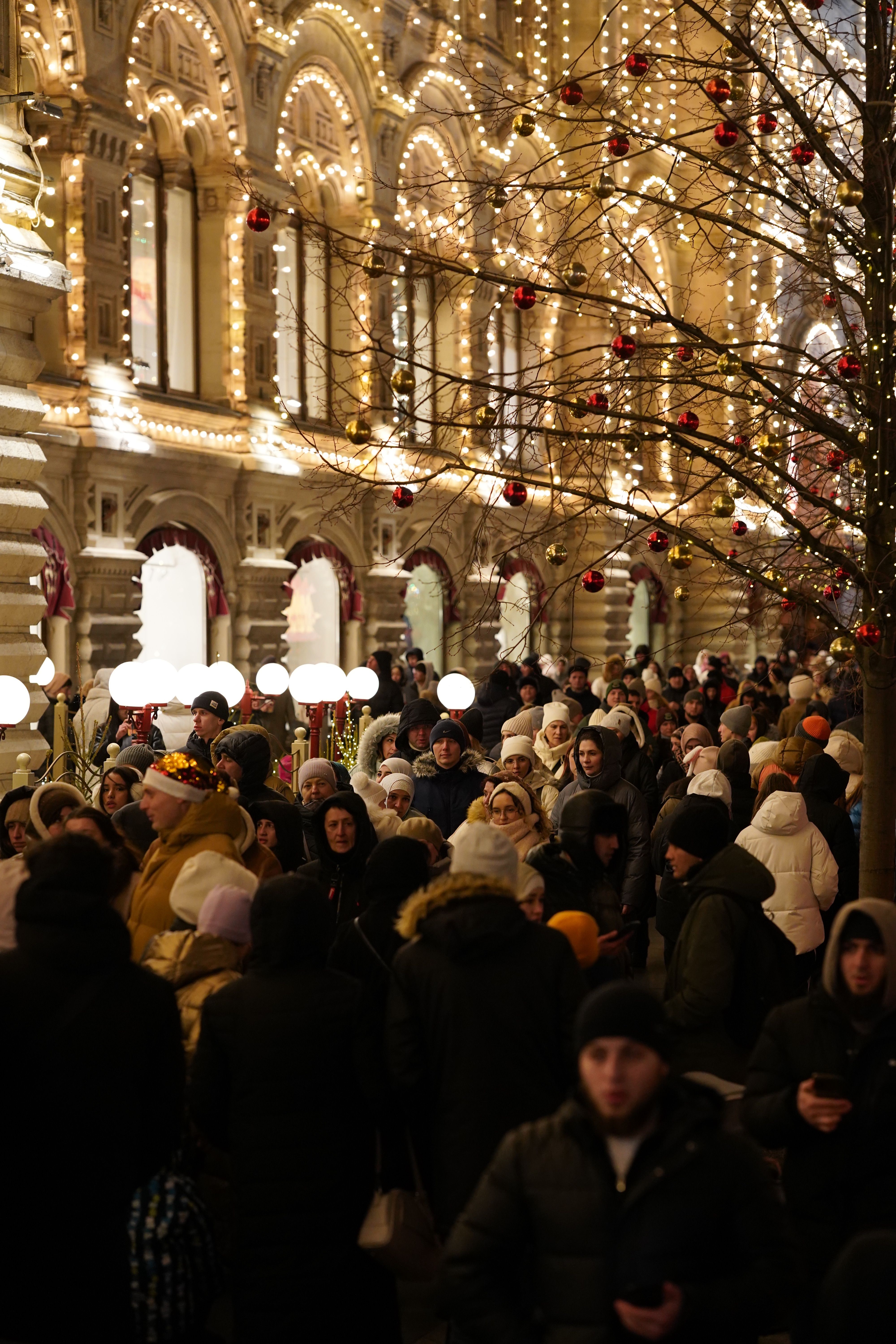 Festive Crowd Enjoys Winter Night Celebration · Free Stock Photo