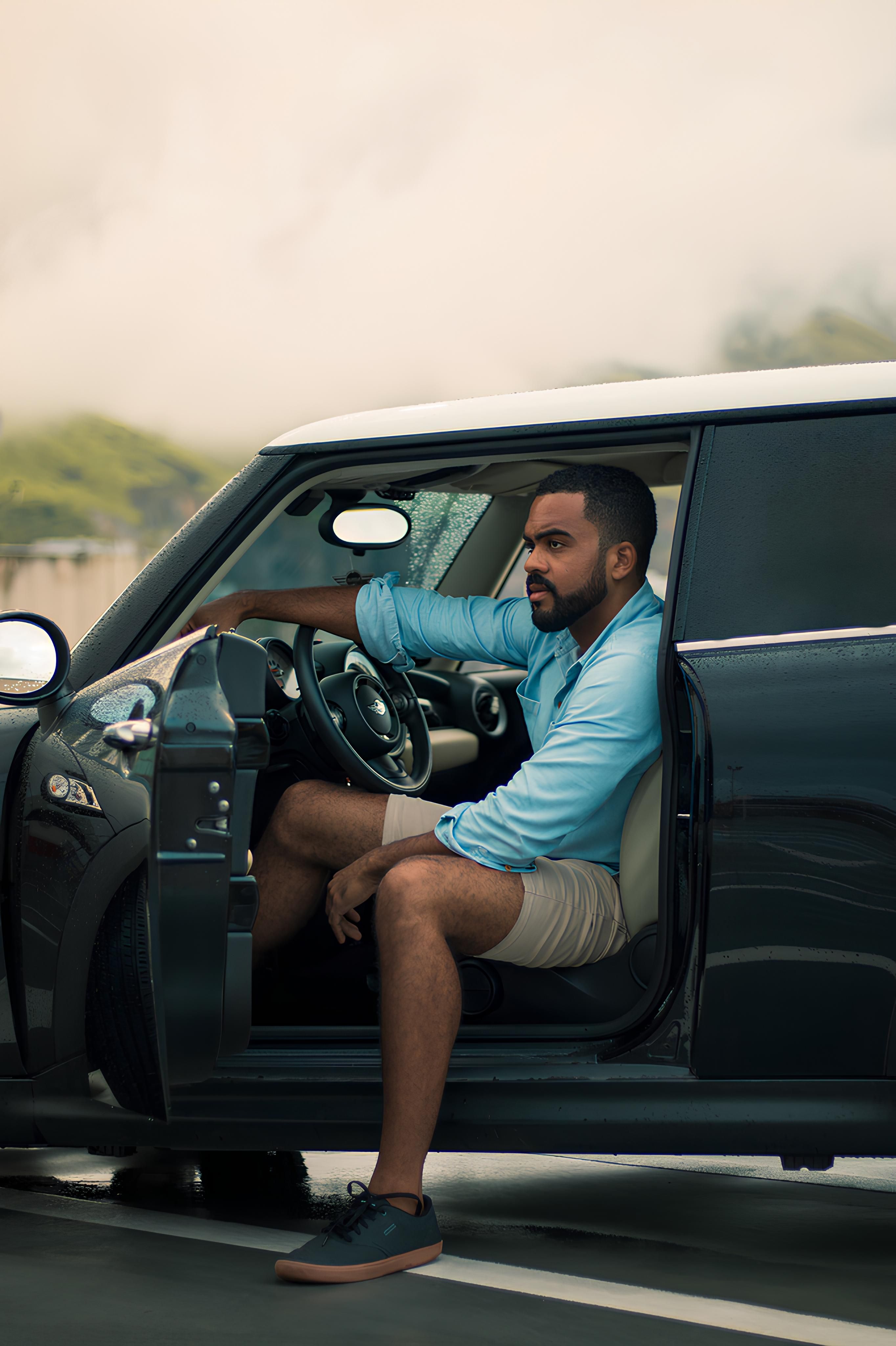 Man in Car on Overcast Day in Nova Iguaçu · Free Stock Photo