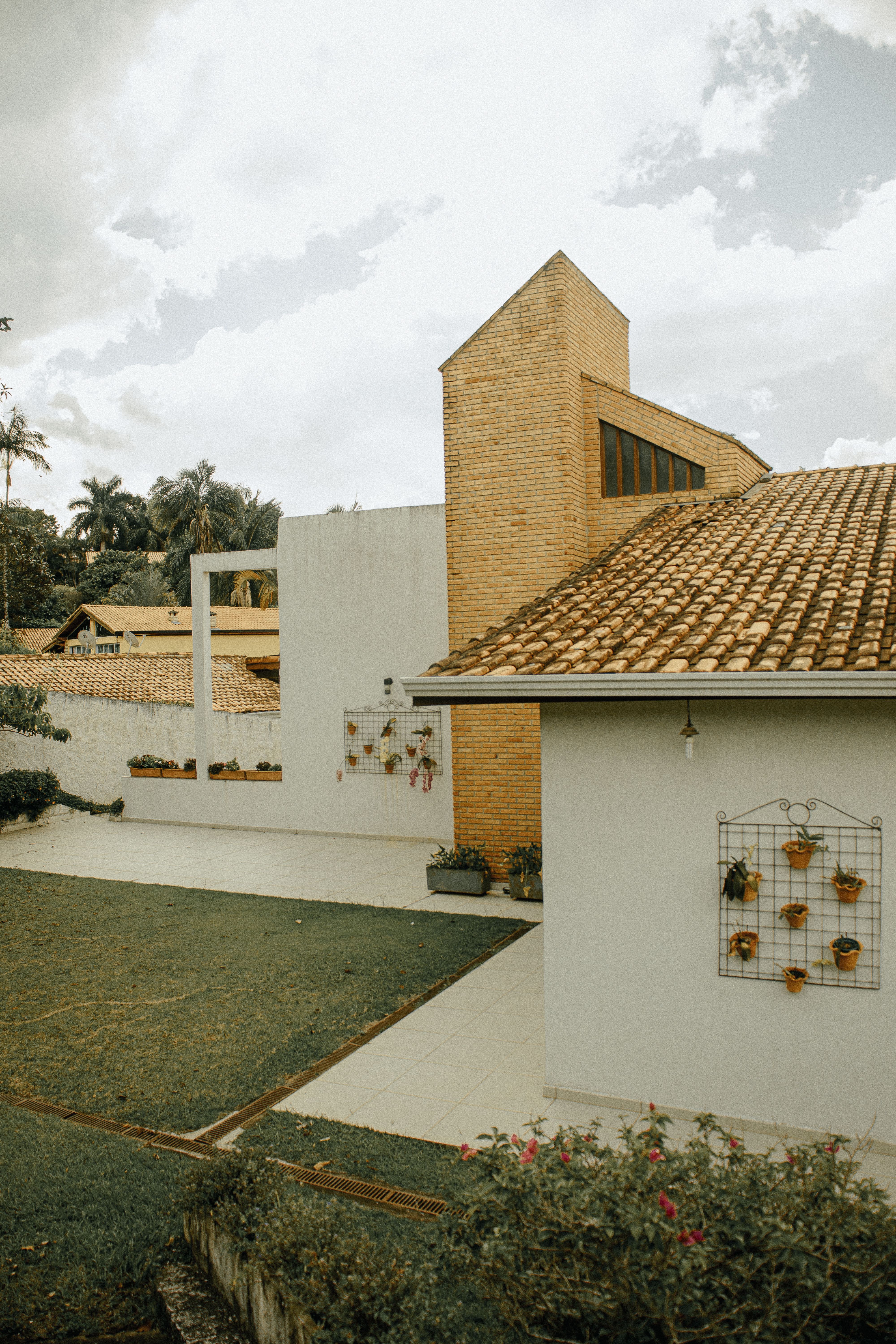 Modern Brick and Tile House with Unique Architecture · Free Stock Photo