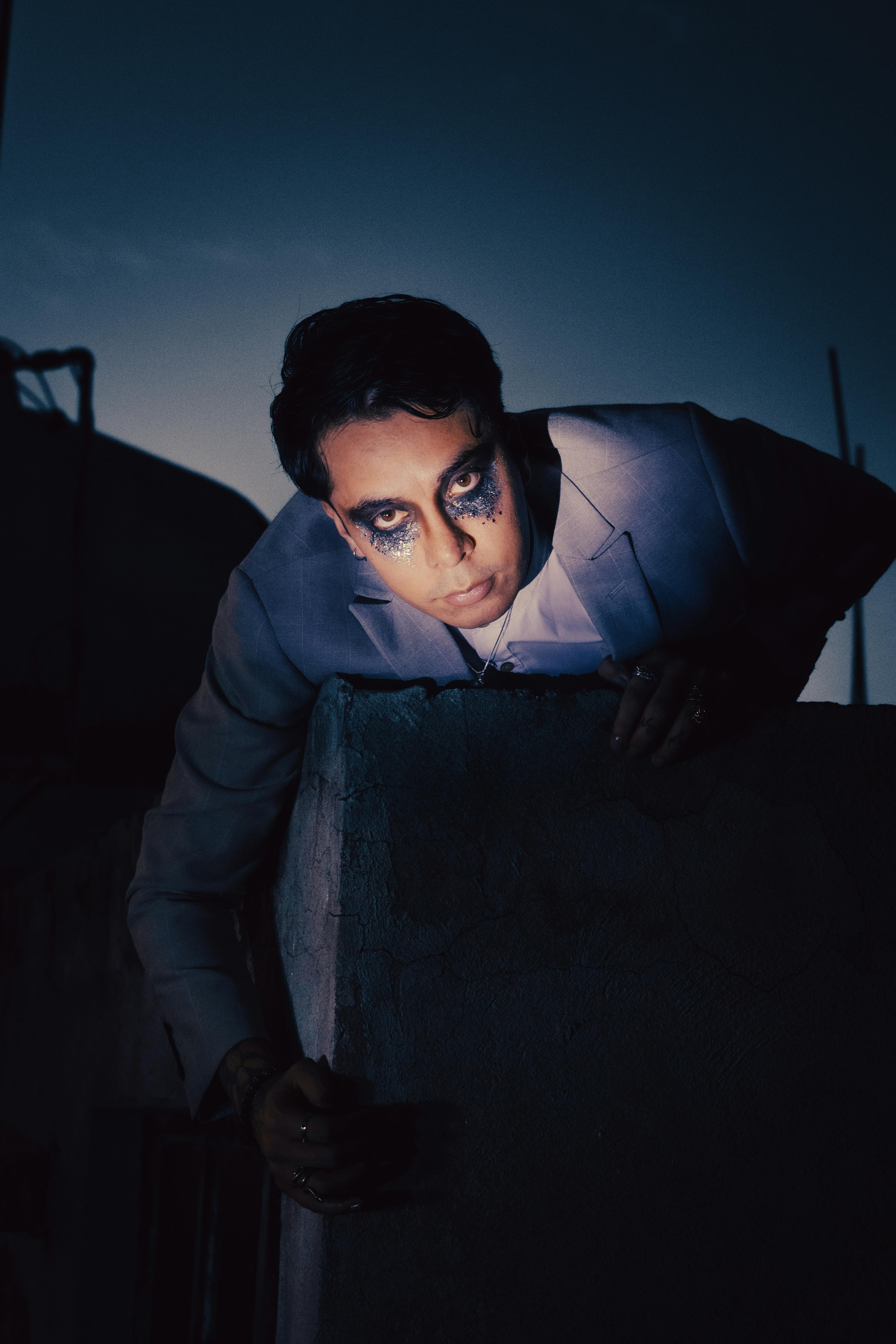 Dramatic Portrait Under Night Sky · Free Stock Photo