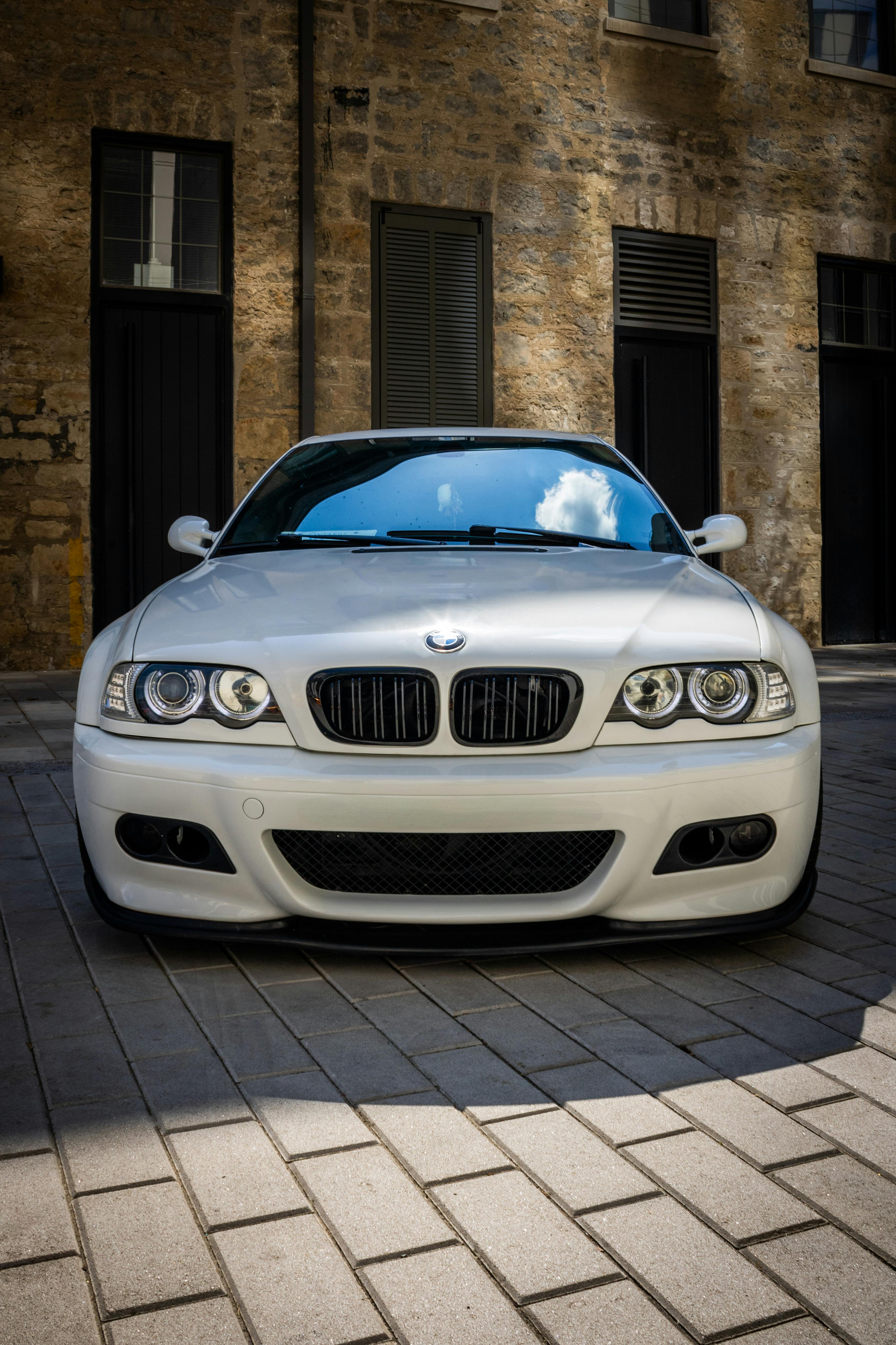 Front View of a Classic White Sports Car · Free Stock Photo