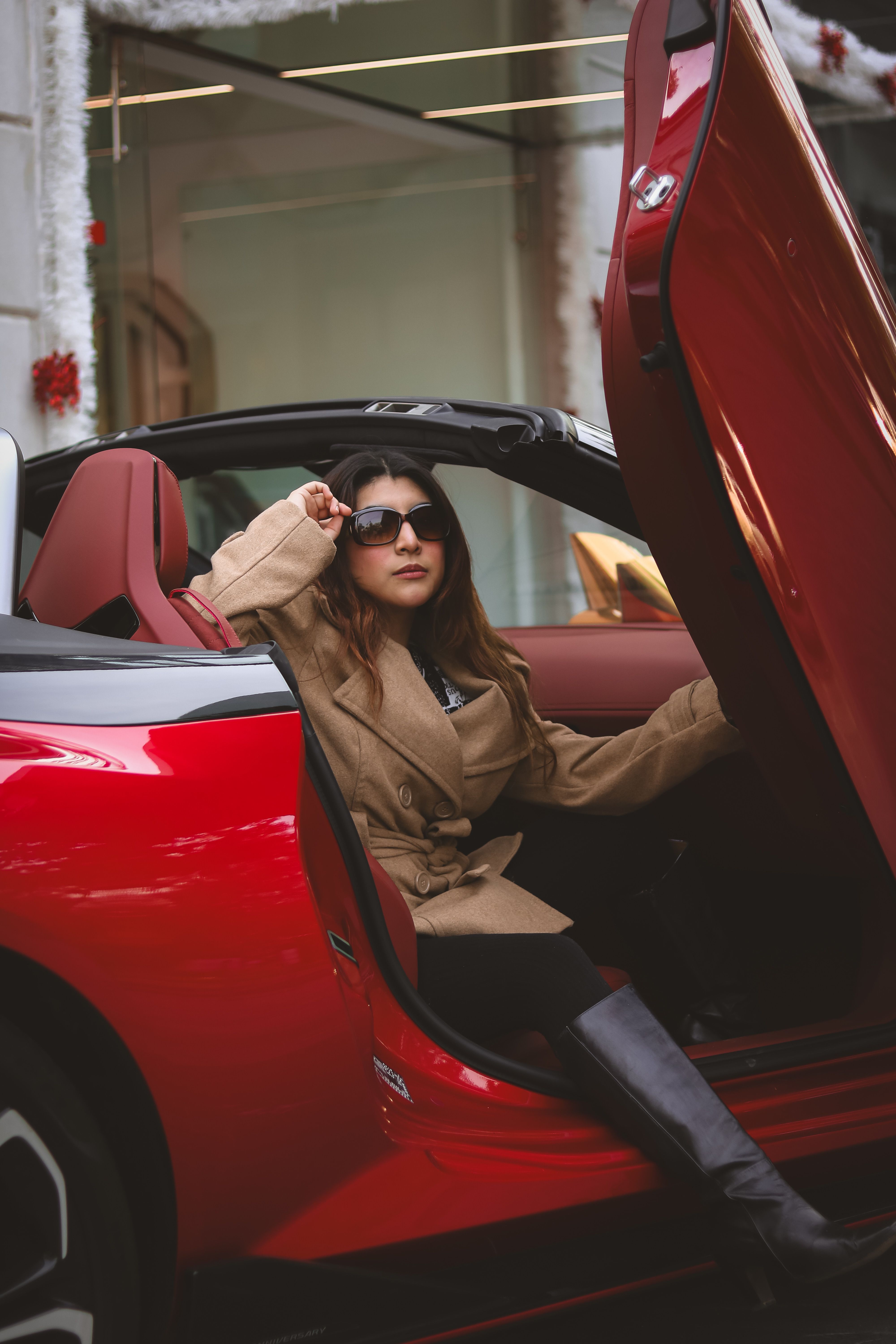 Stylish Woman in a Convertible Car · Free Stock Photo