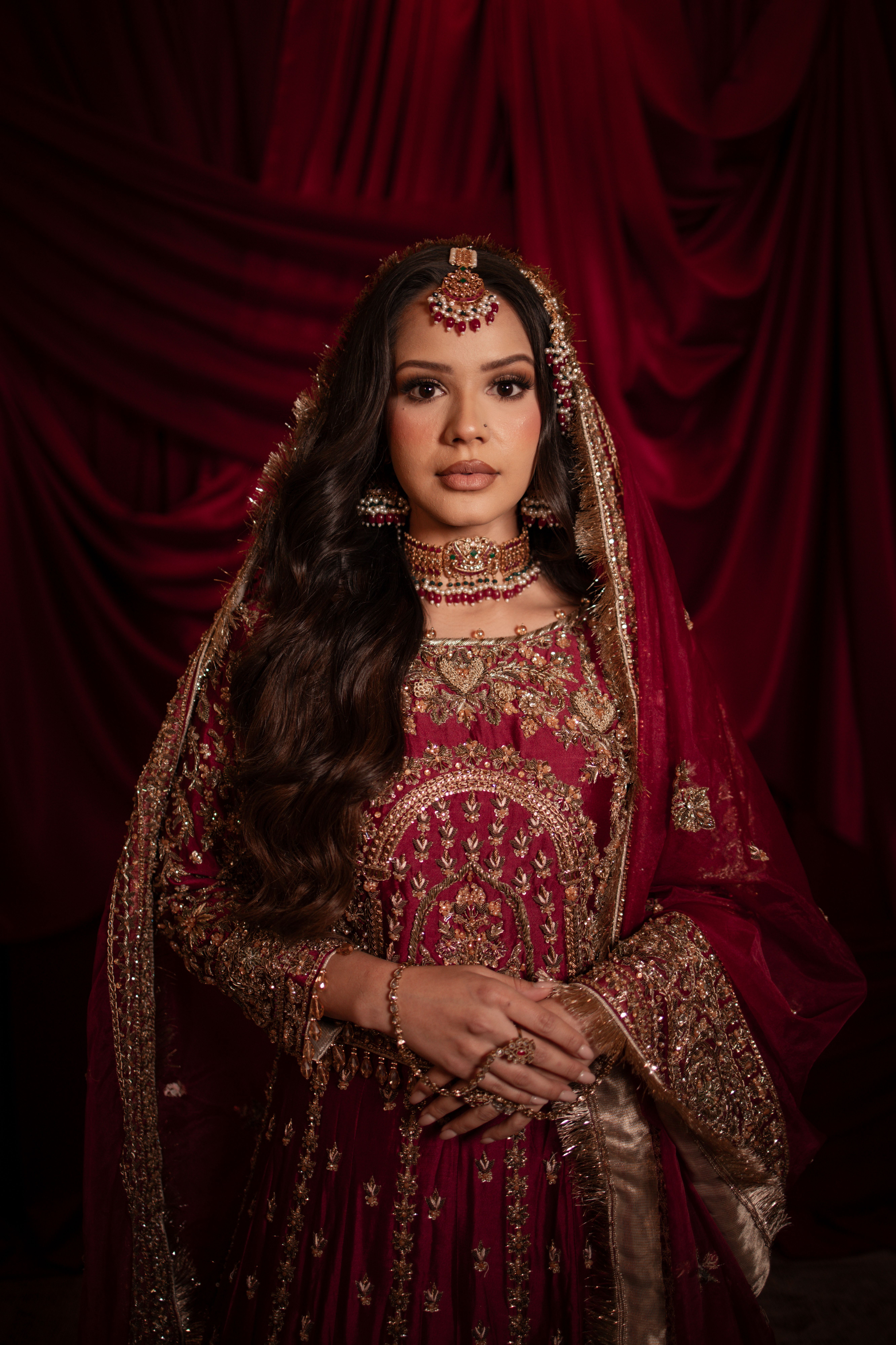 Elegant Bride in Traditional Red Wedding Attire · Free Stock Photo