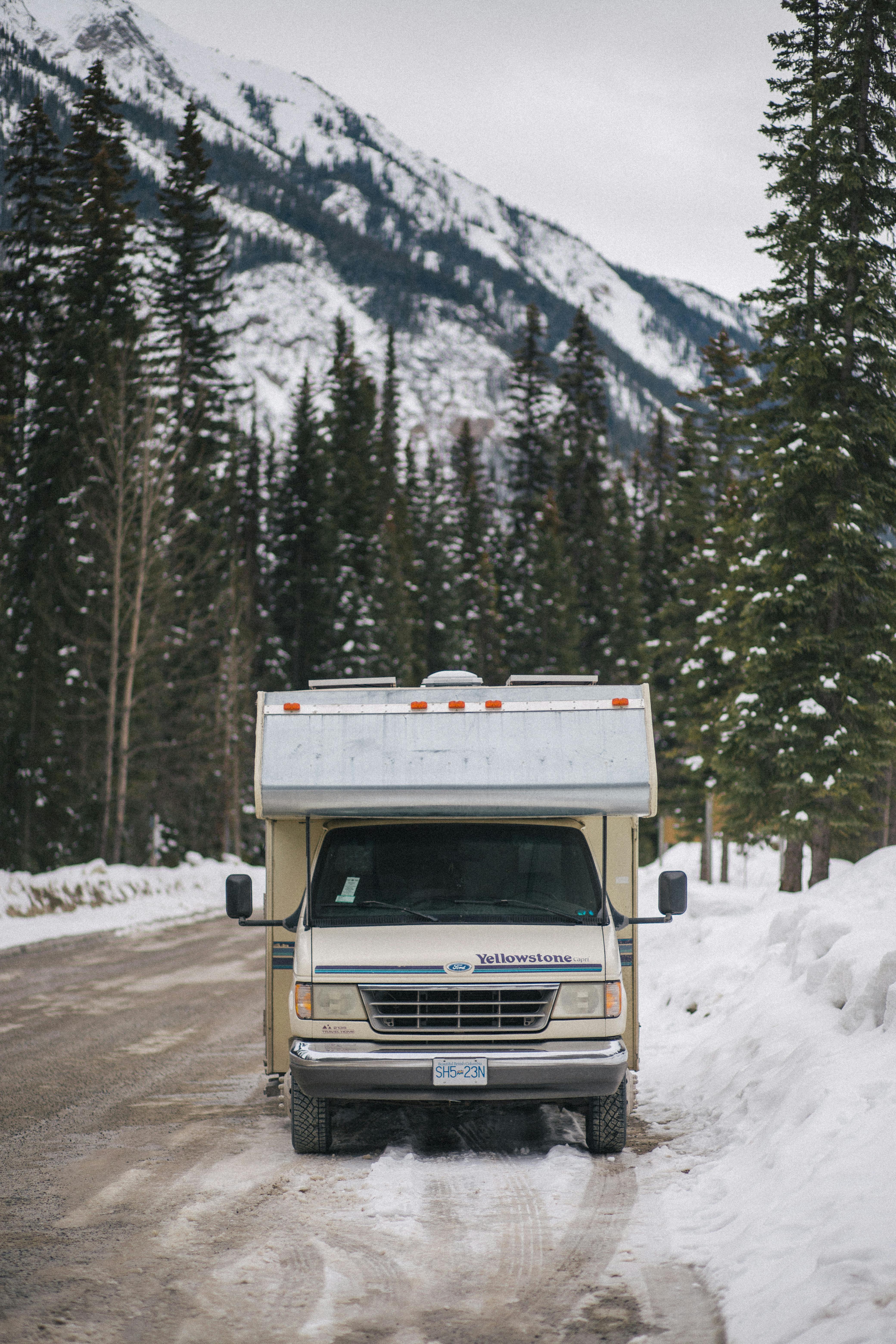 RV in Snowy Banff National Park, Canada · Free Stock Photo