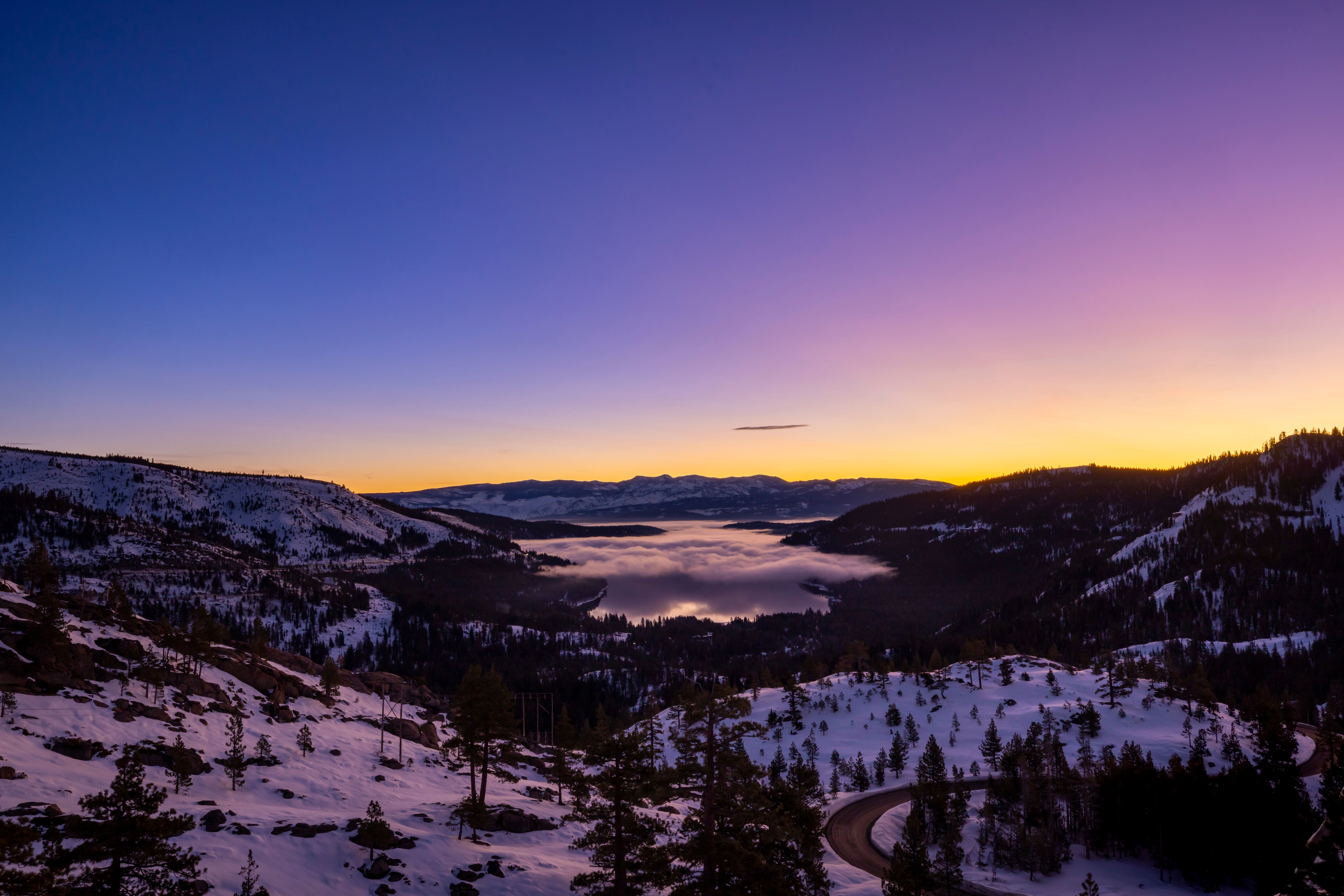 Dawn Over Donner Pass with Fog and Snow · Free Stock Photo