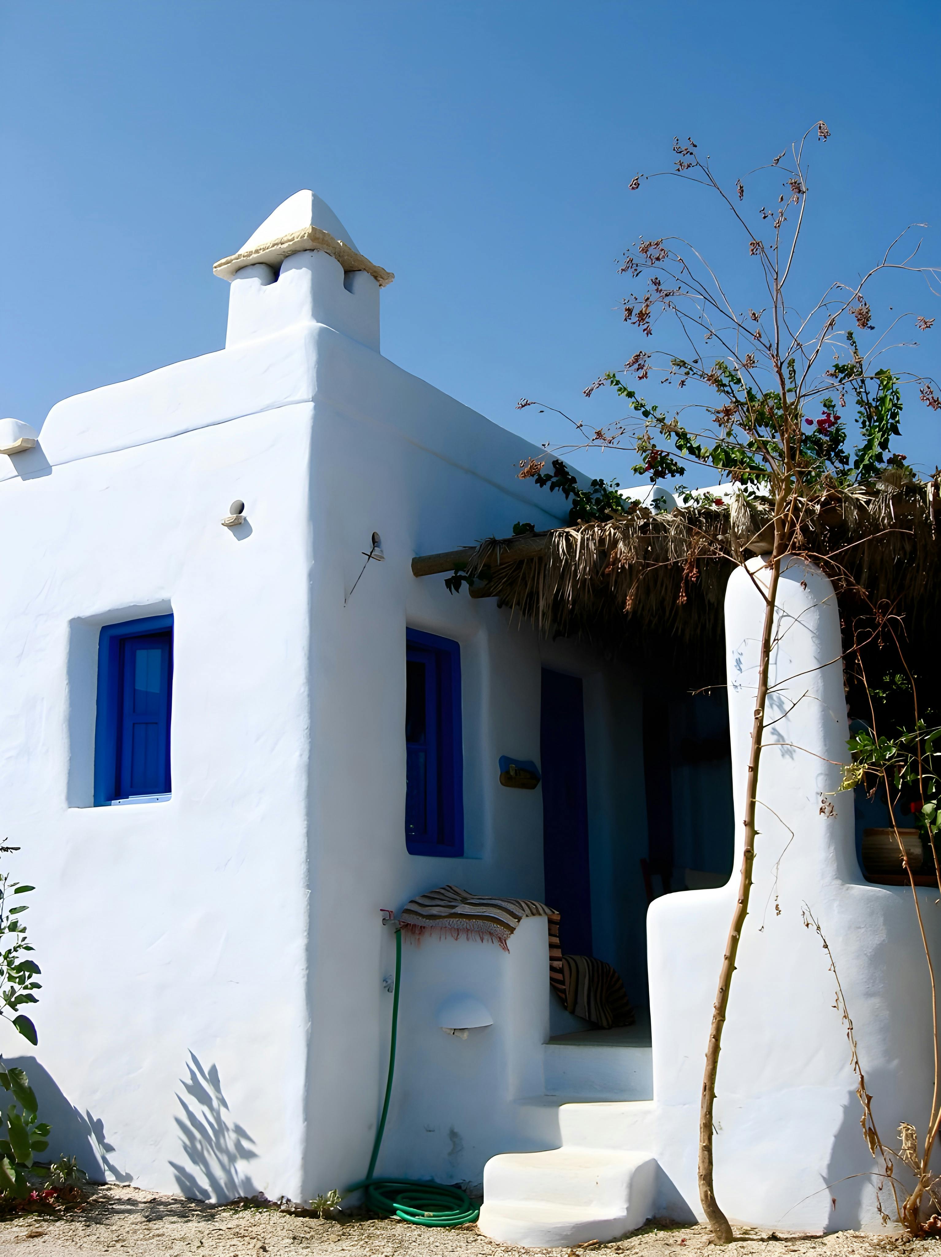 Charming Cycladic House with Blue Accents · Free Stock Photo