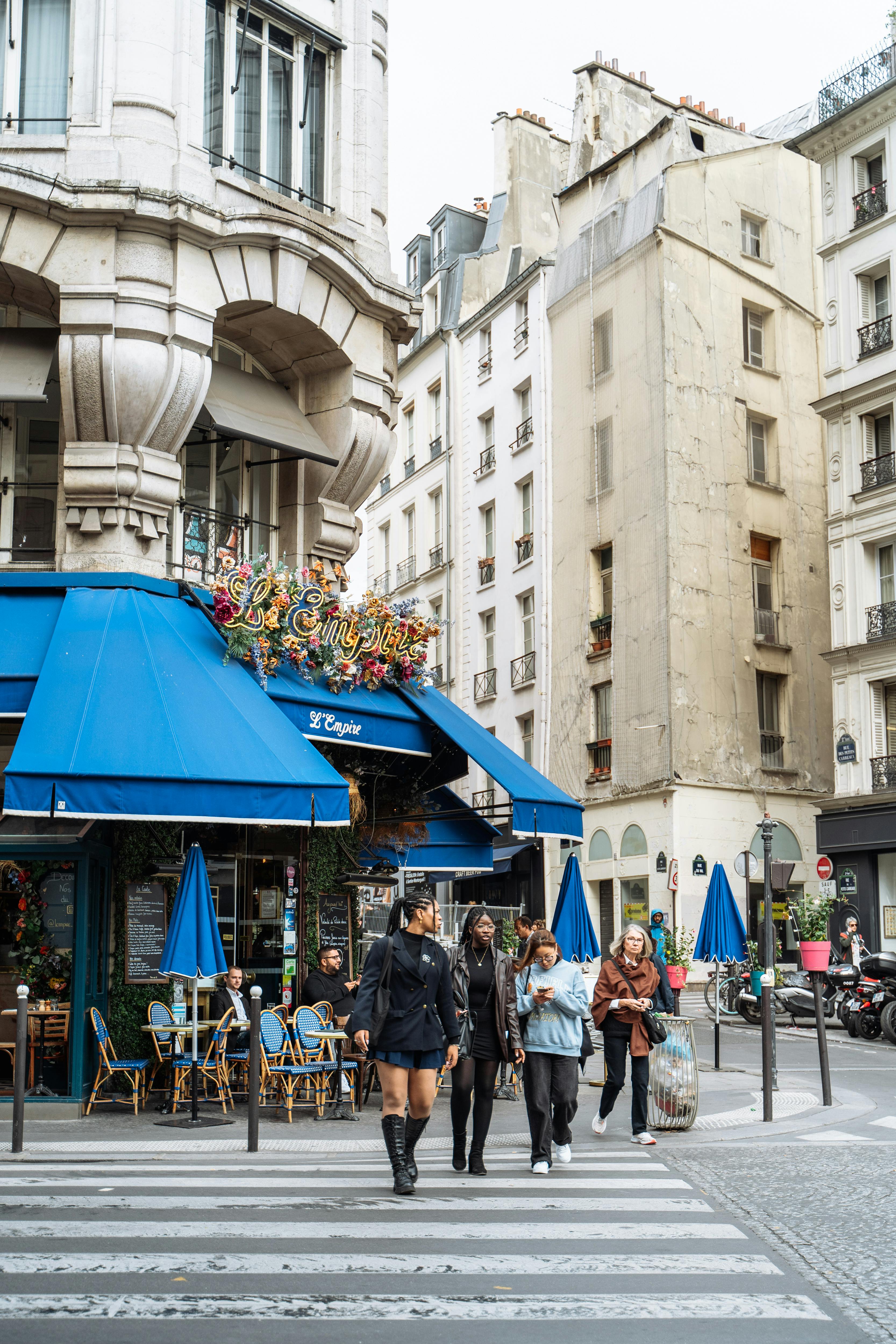 Quaint Parisian Cafe Street Scene in Paris · Free Stock Photo