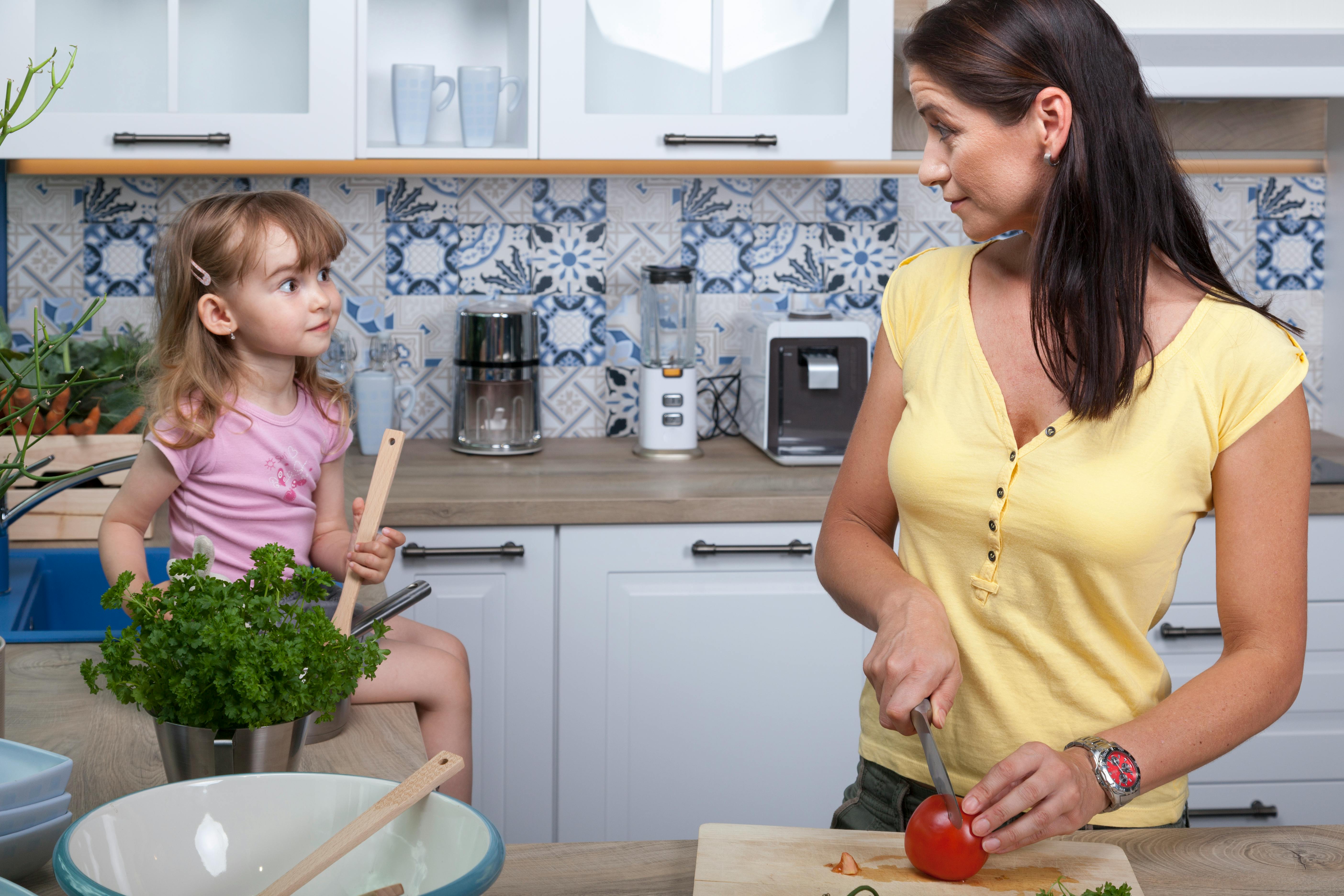 Mother and Child Cooking Together in Modern Kitchen · Free Stock Photo