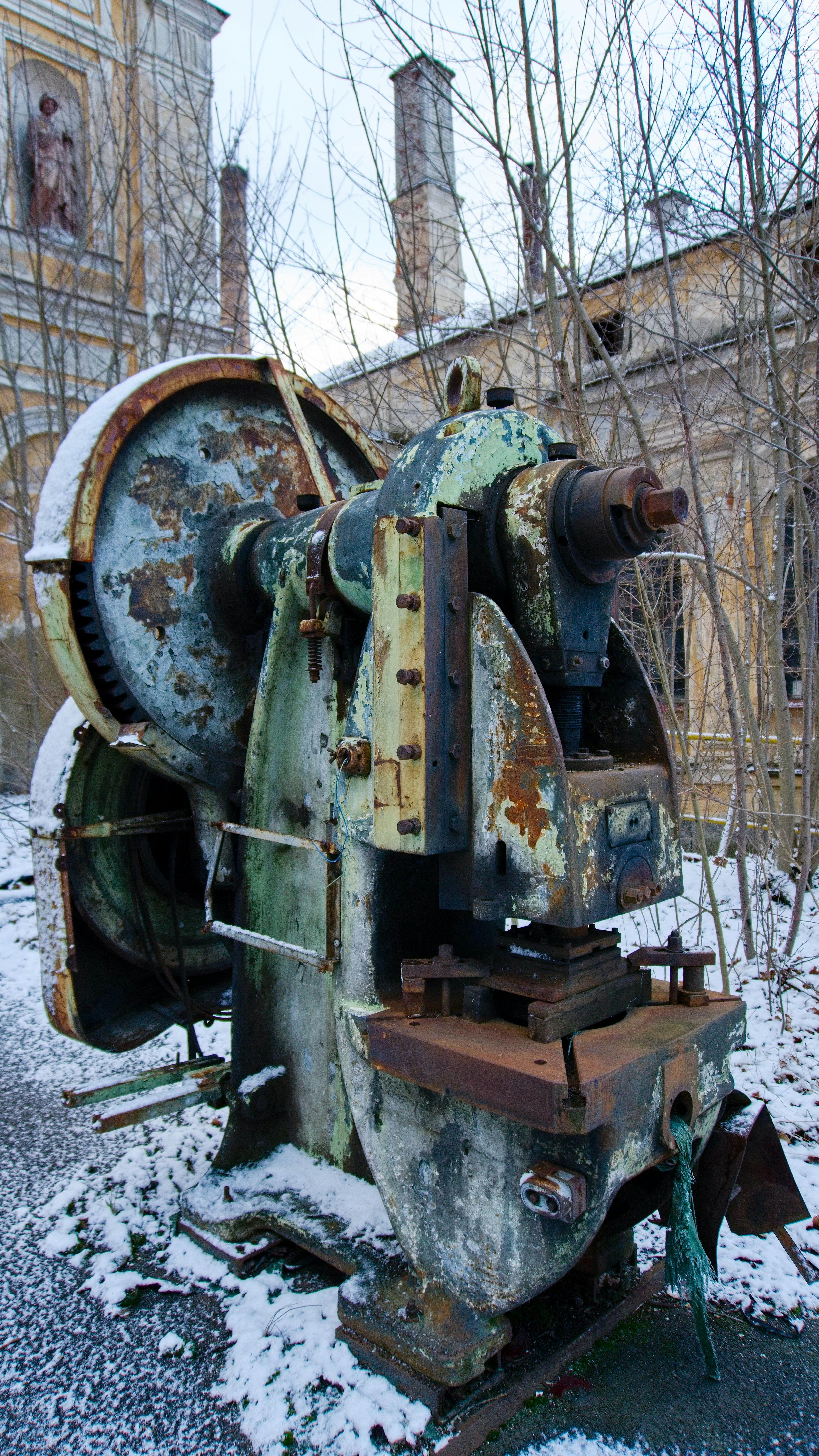 Abandoned Rusty Industrial Machine Outdoors · Free Stock Photo