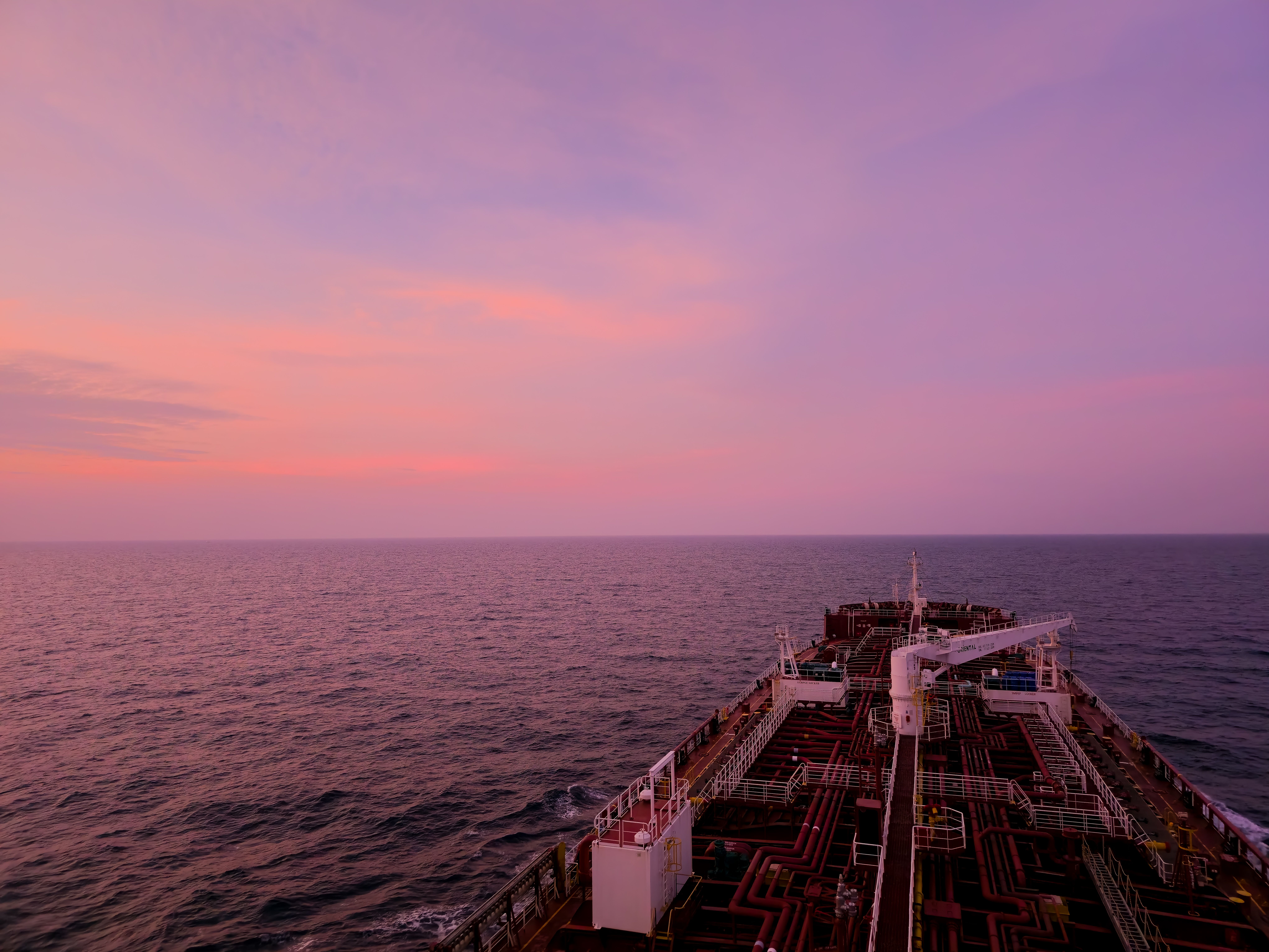 Sunset View from a Cargo Ship on Open Sea · Free Stock Photo