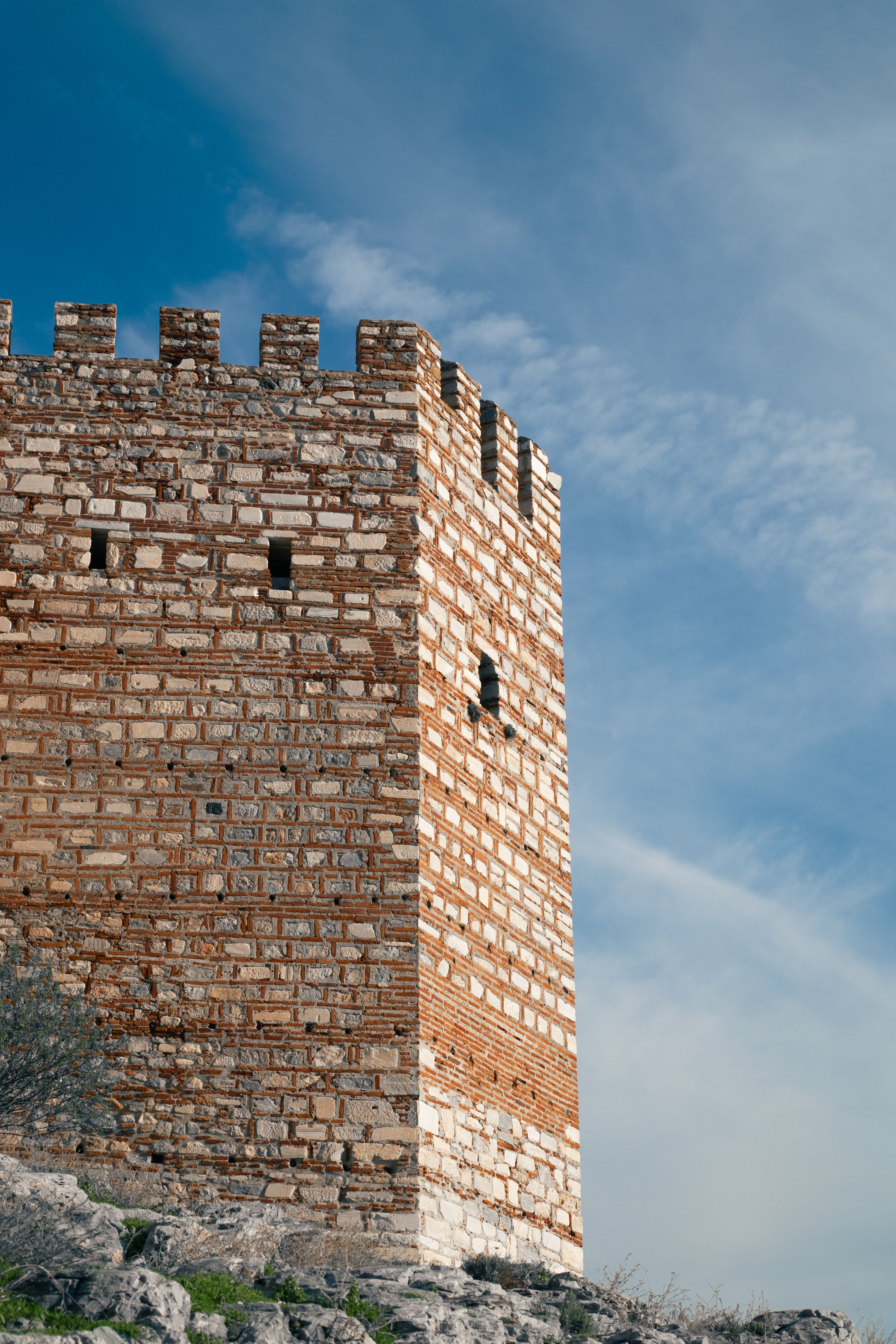 Historic Fortress Tower Against Blue Sky · Free Stock Photo