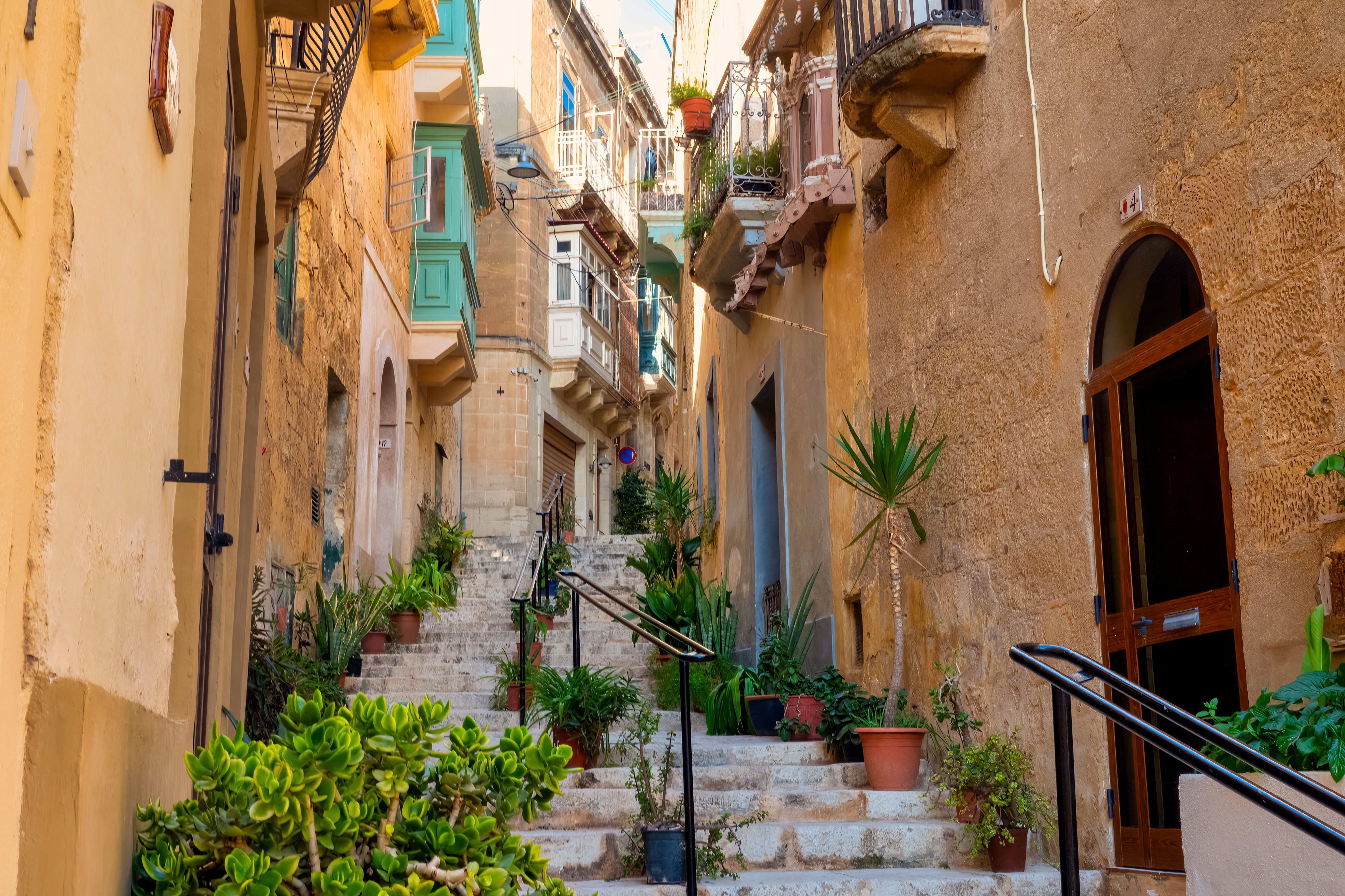 Charming Narrow Alley in Malta's Historic District · Free Stock Photo