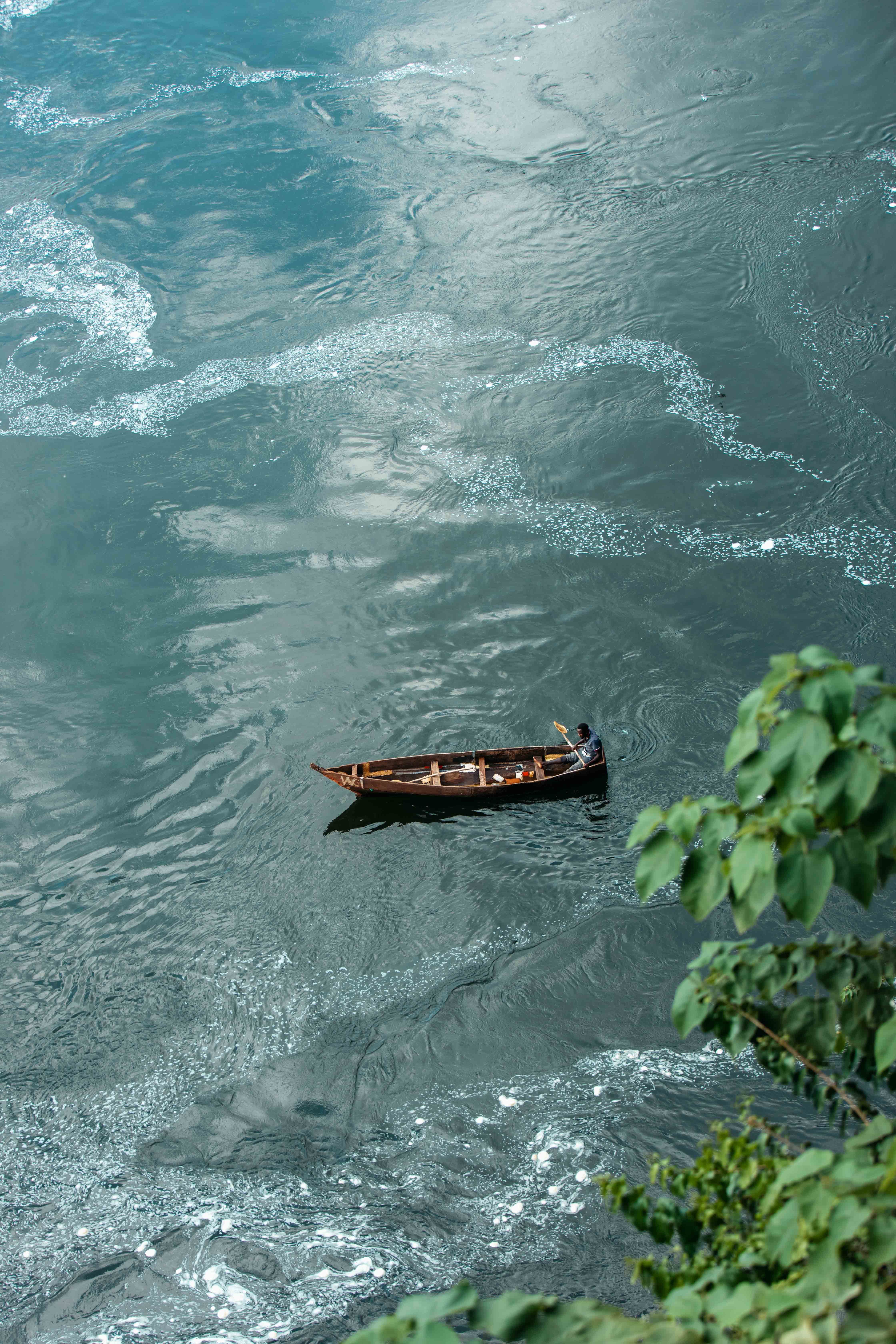 Scenic River with Single Canoe View · Free Stock Photo