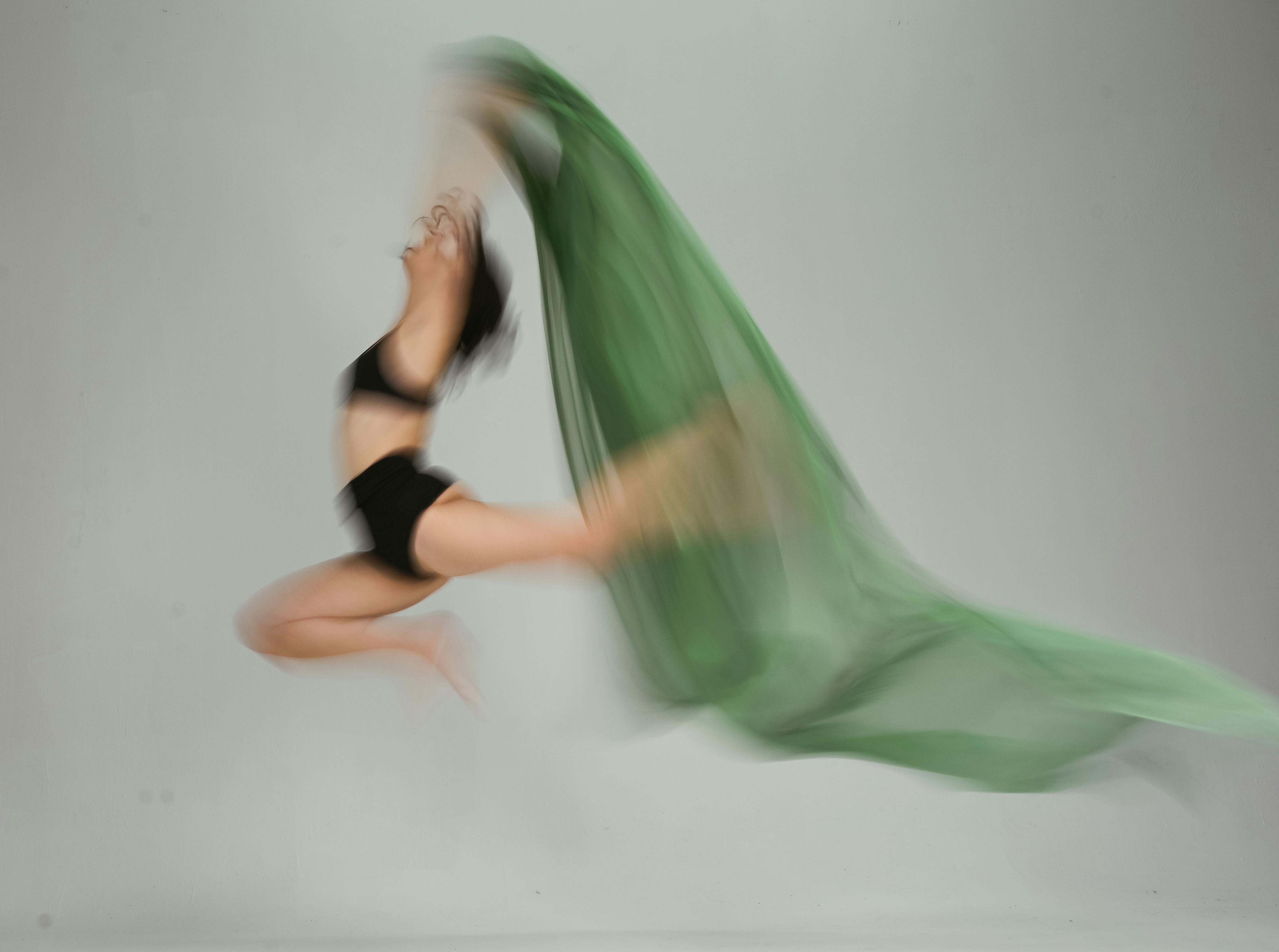 Dynamic Dance Movement with Flowing Fabric · Free Stock Photo