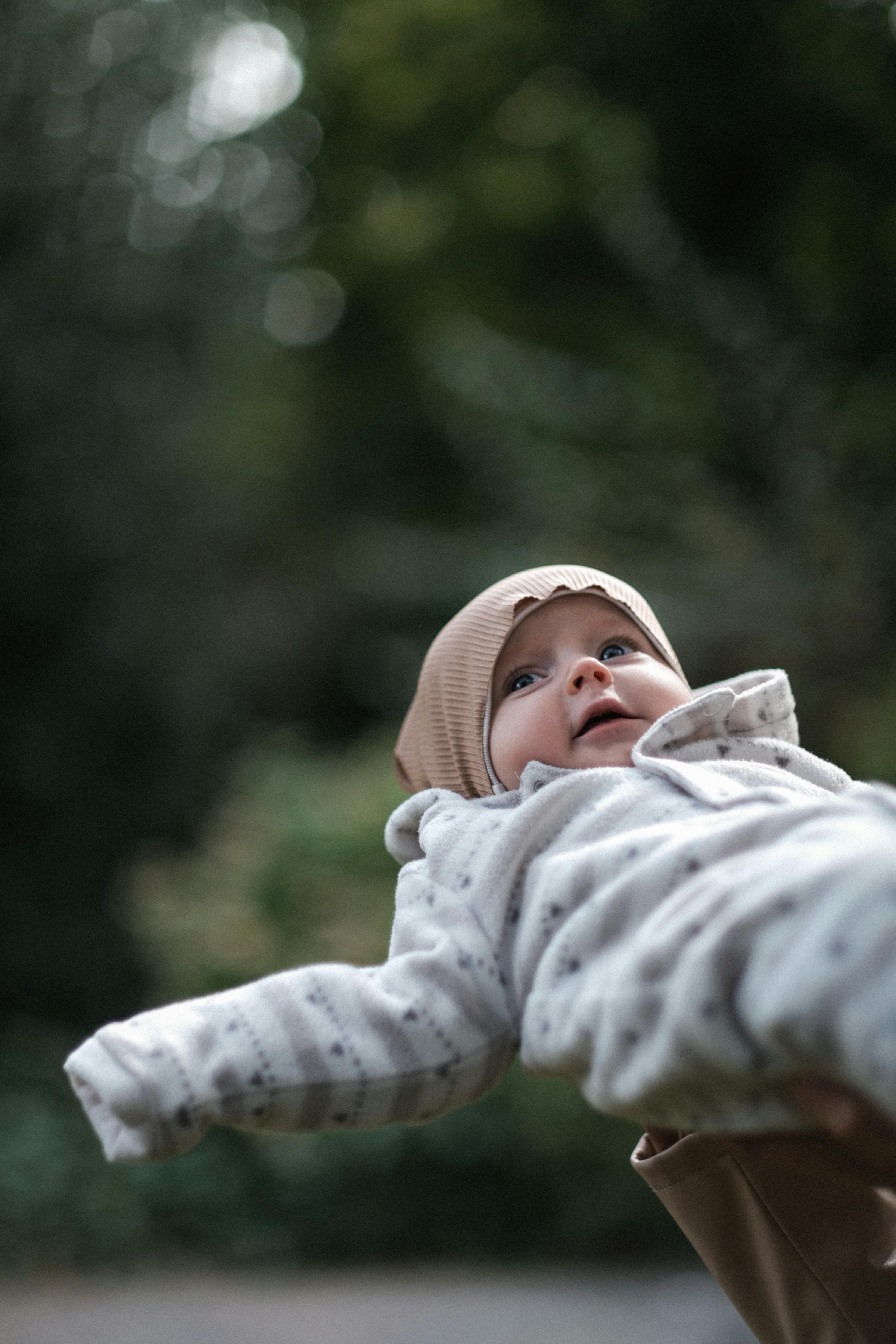 Adorable Baby in Warm Outdoor Clothing · Free Stock Photo