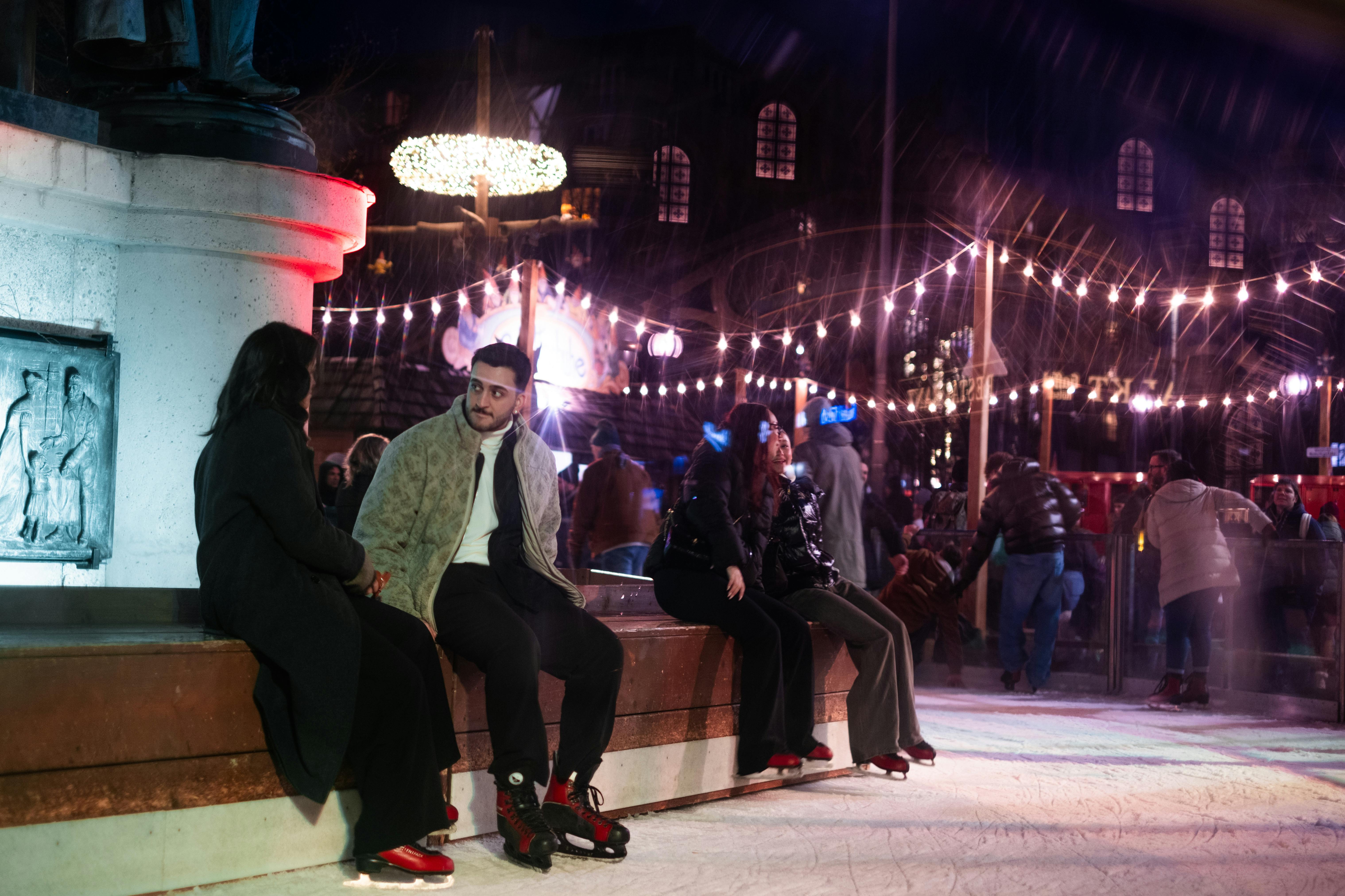 Nighttime Ice Skating with Colorful String Lights · Free Stock Photo