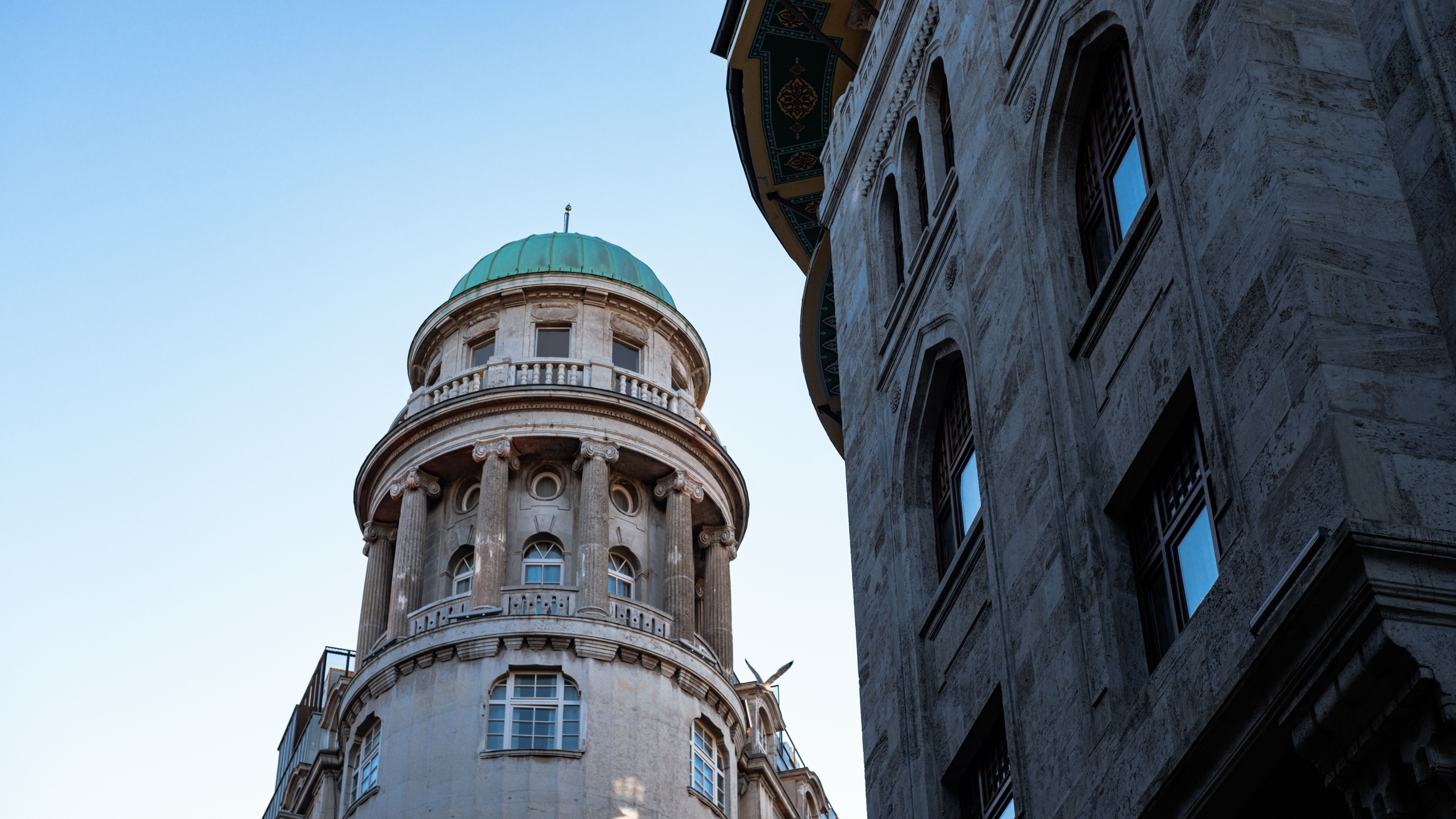 Historic Building with Green Dome Against Blue Sky · Free Stock Photo