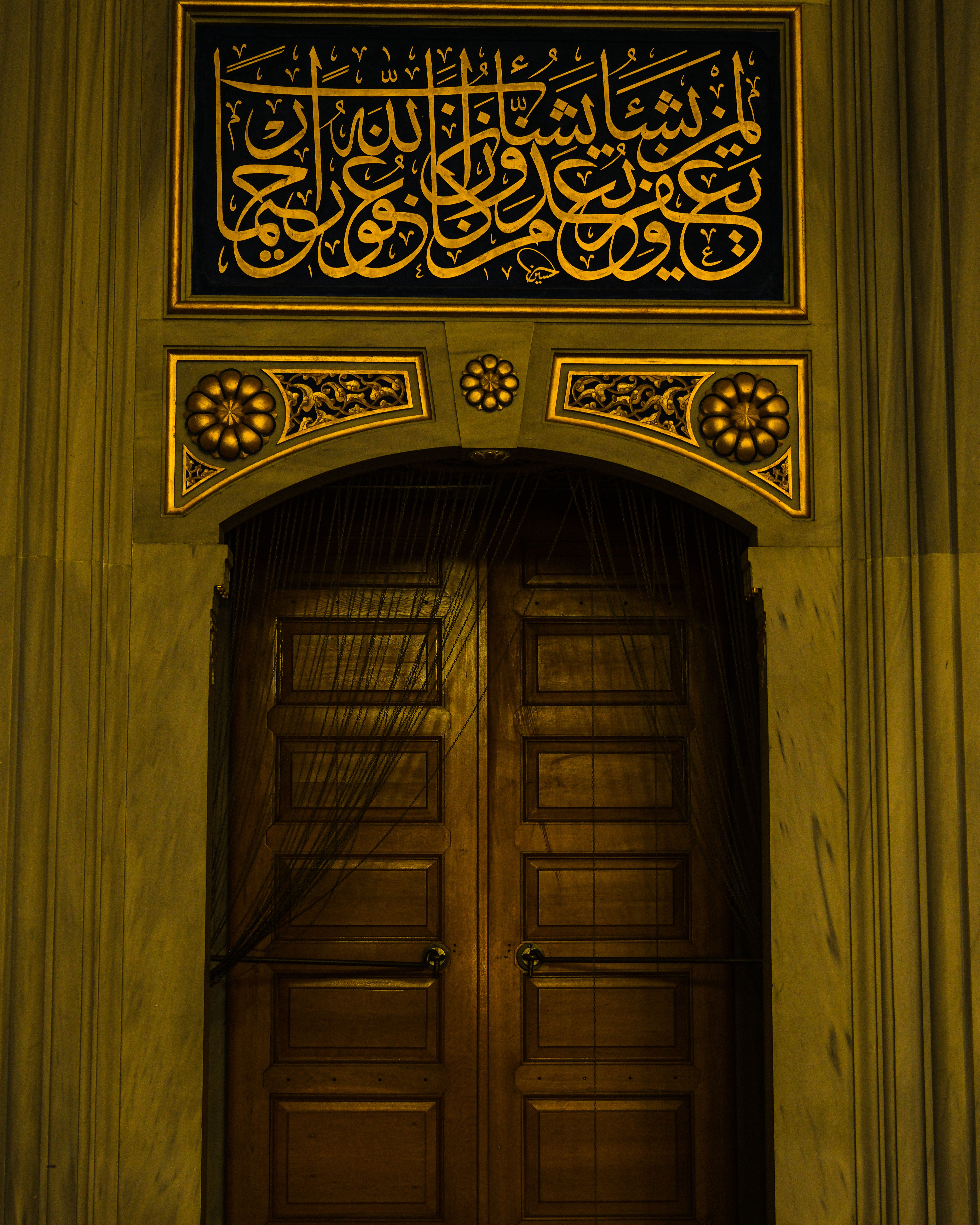 Intricate Islamic Doorway with Arabic Calligraphy · Free Stock Photo