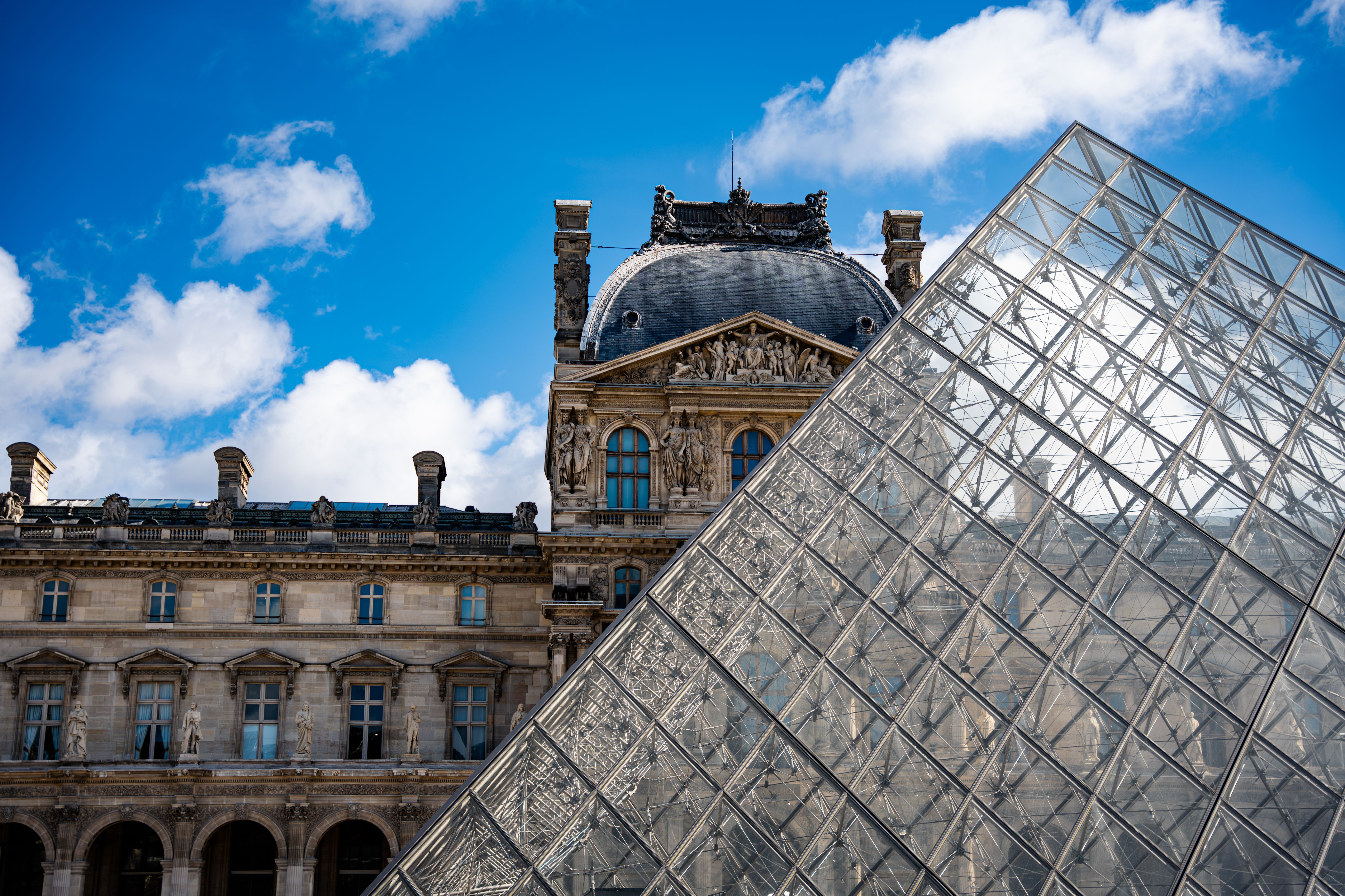 Louvre Pyramid and Historical Architecture in Paris · Free Stock Photo