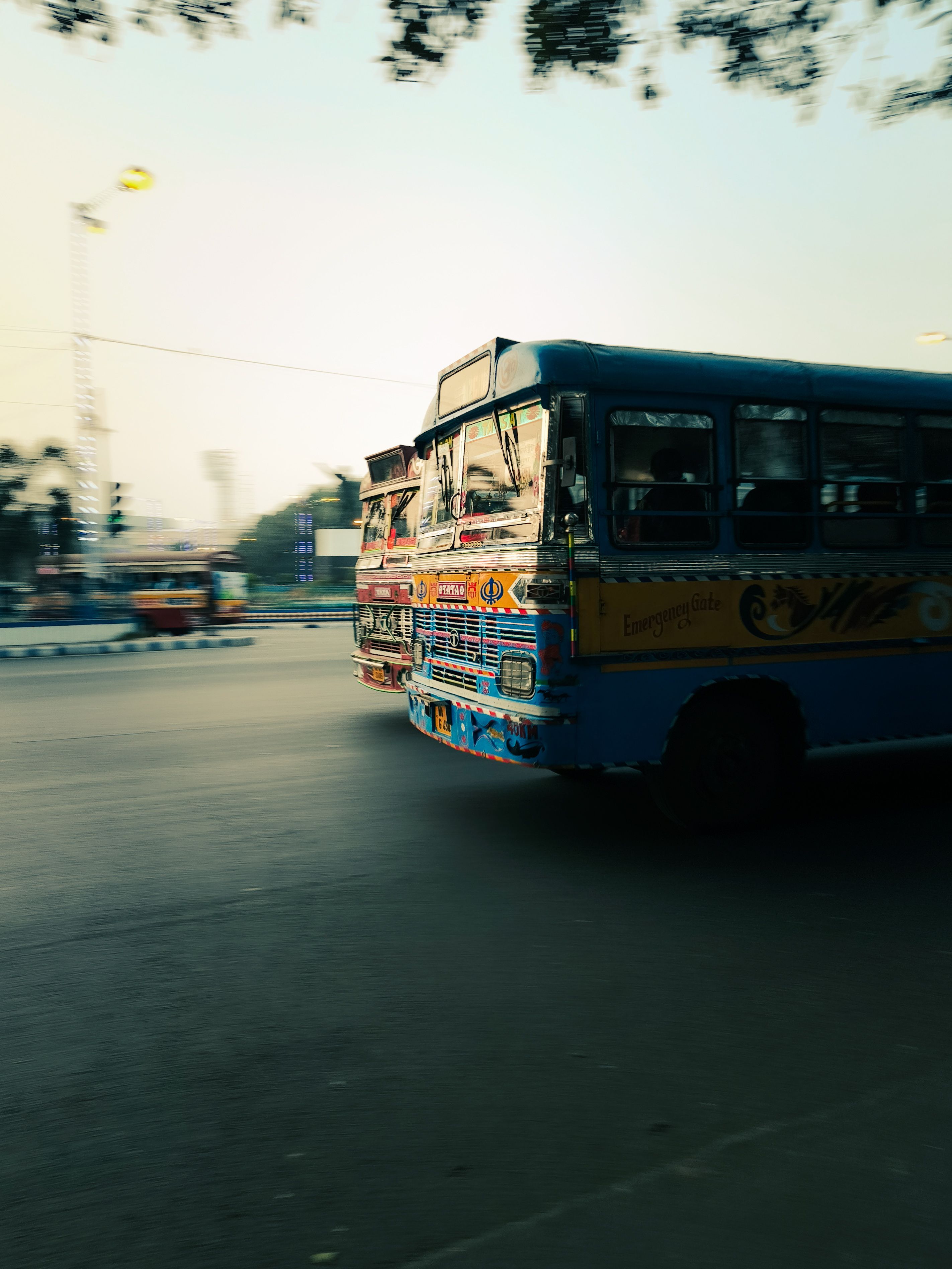Motion Blur of Vintage City Buses on Road · Free Stock Photo