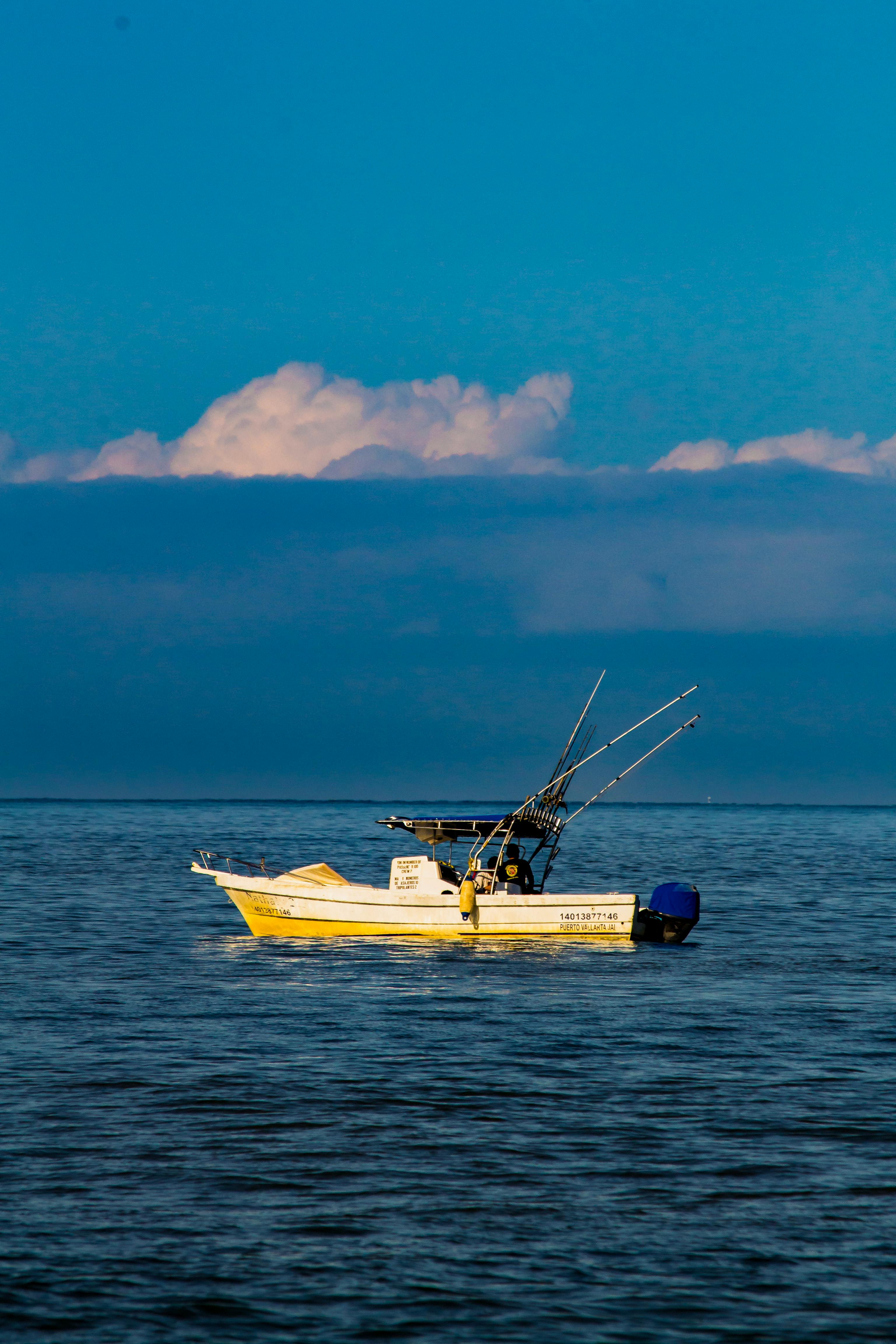Small Fishing Boat on the Pacific Ocean · Free Stock Photo