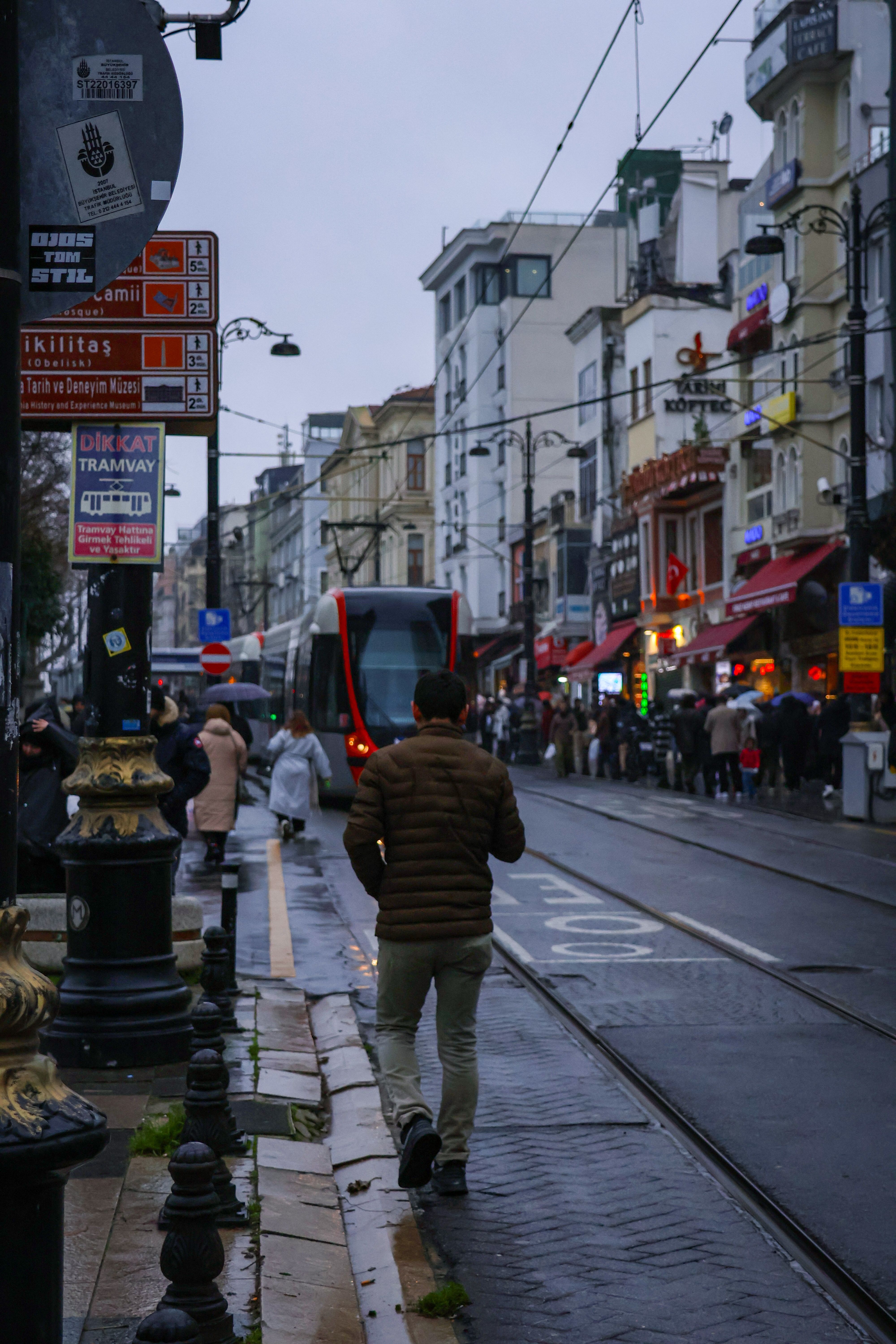 Busy Istanbul Street with Tram and Pedestrians · Free Stock Photo