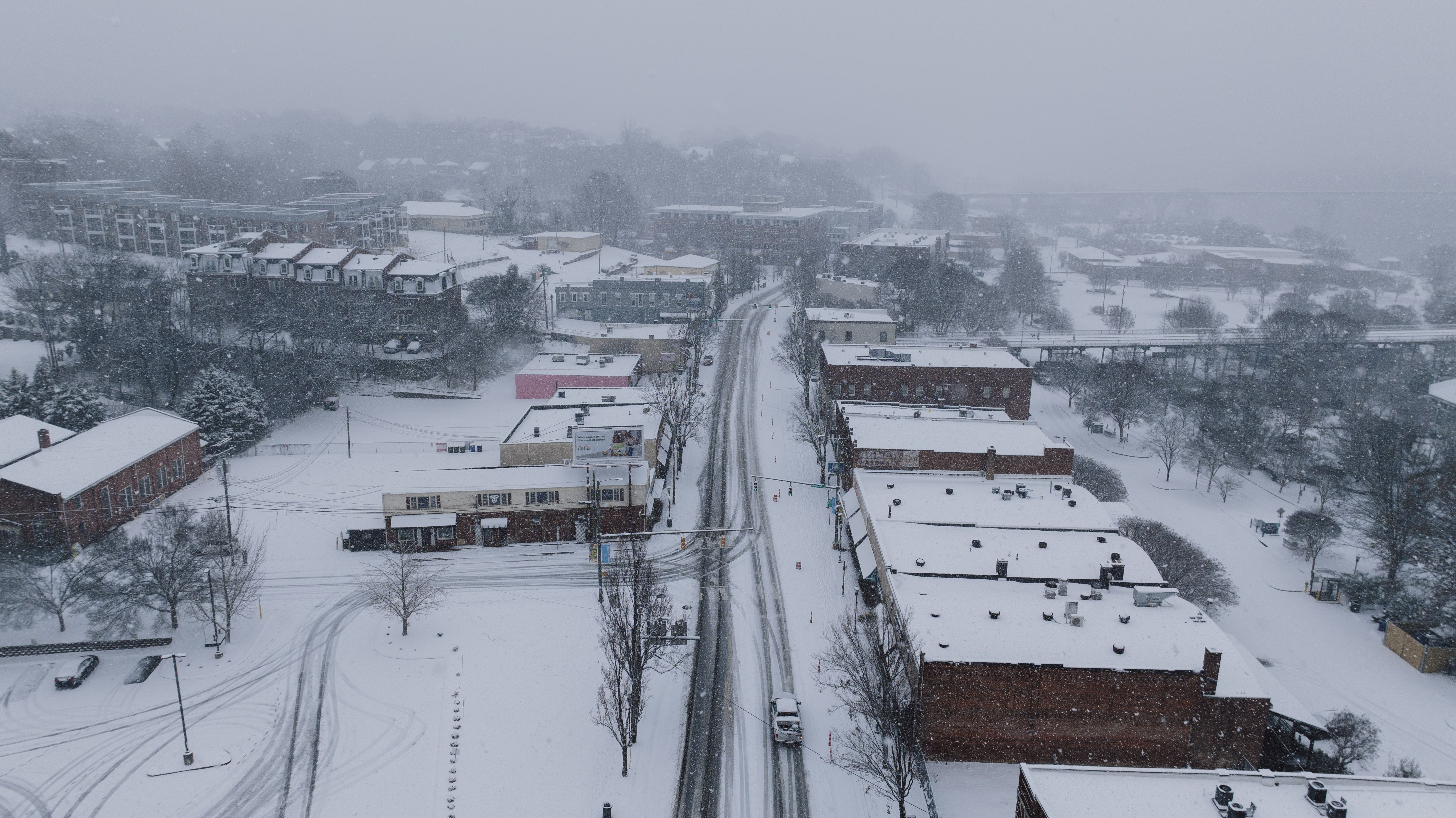 Aerial Winter View of Snowy Urban Landscape · Free Stock Photo