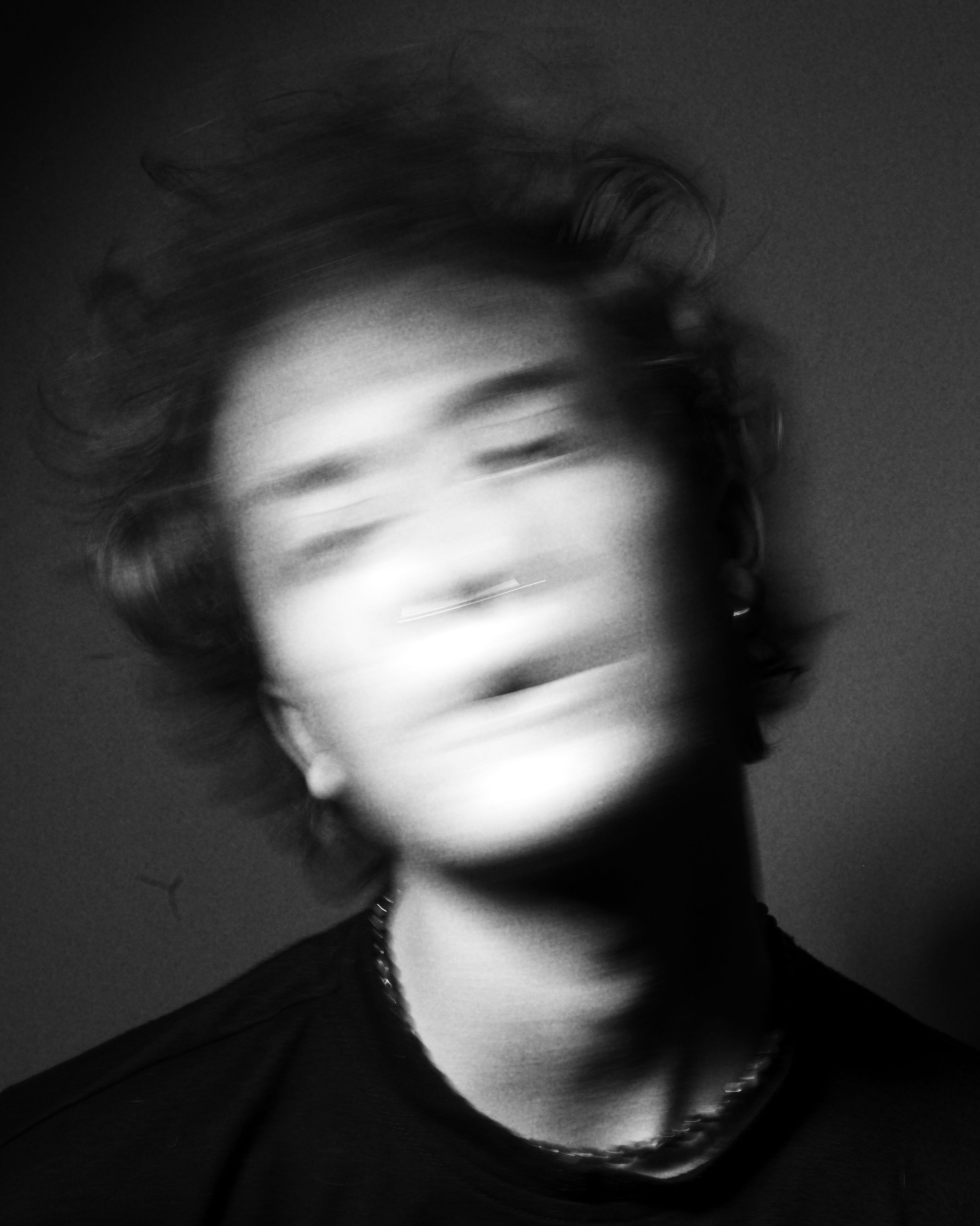 Abstract Blurred Motion Portrait in Black and White · Free Stock Photo