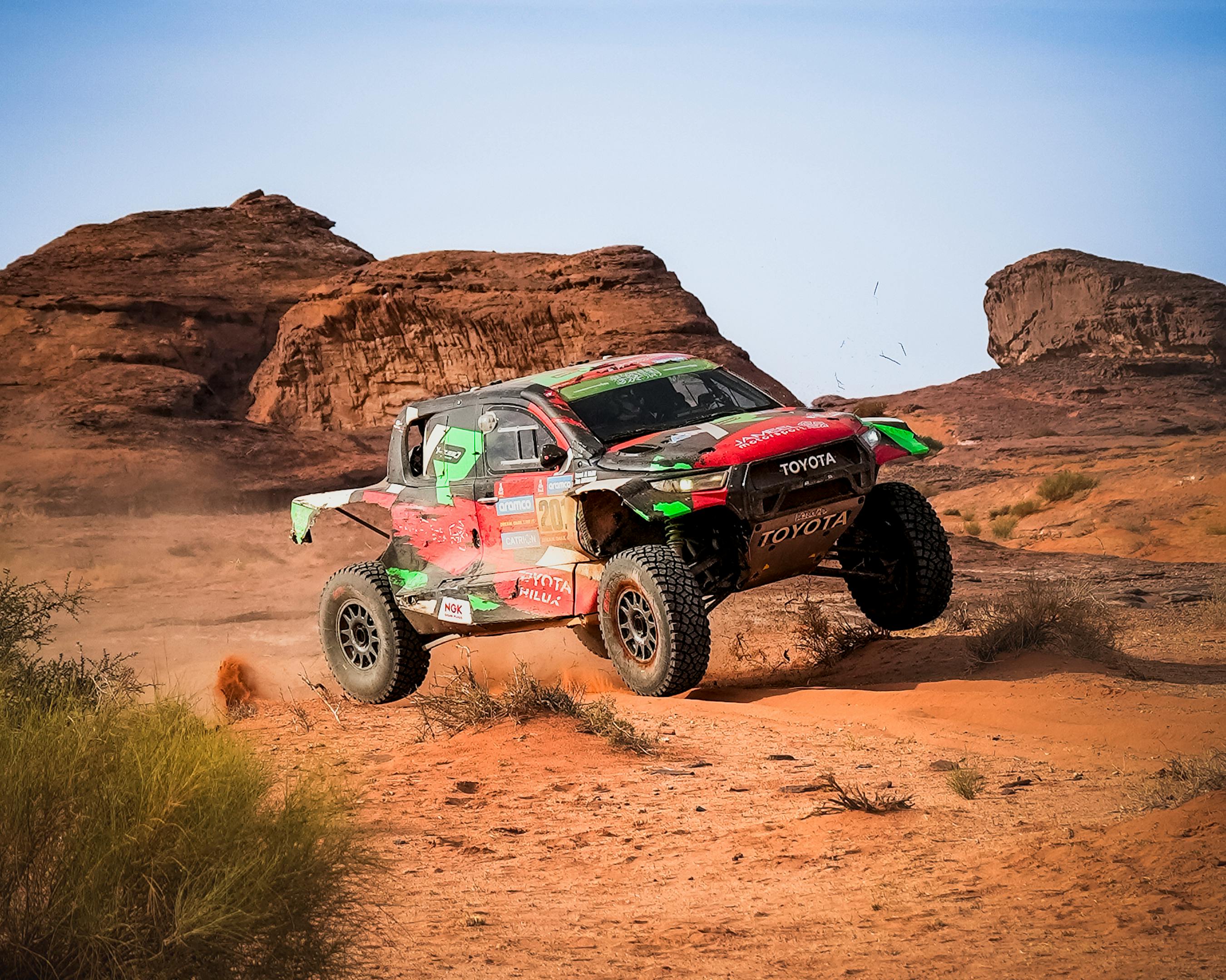 Exciting Off-Road Rally Race in Desert Terrain · Free Stock Photo