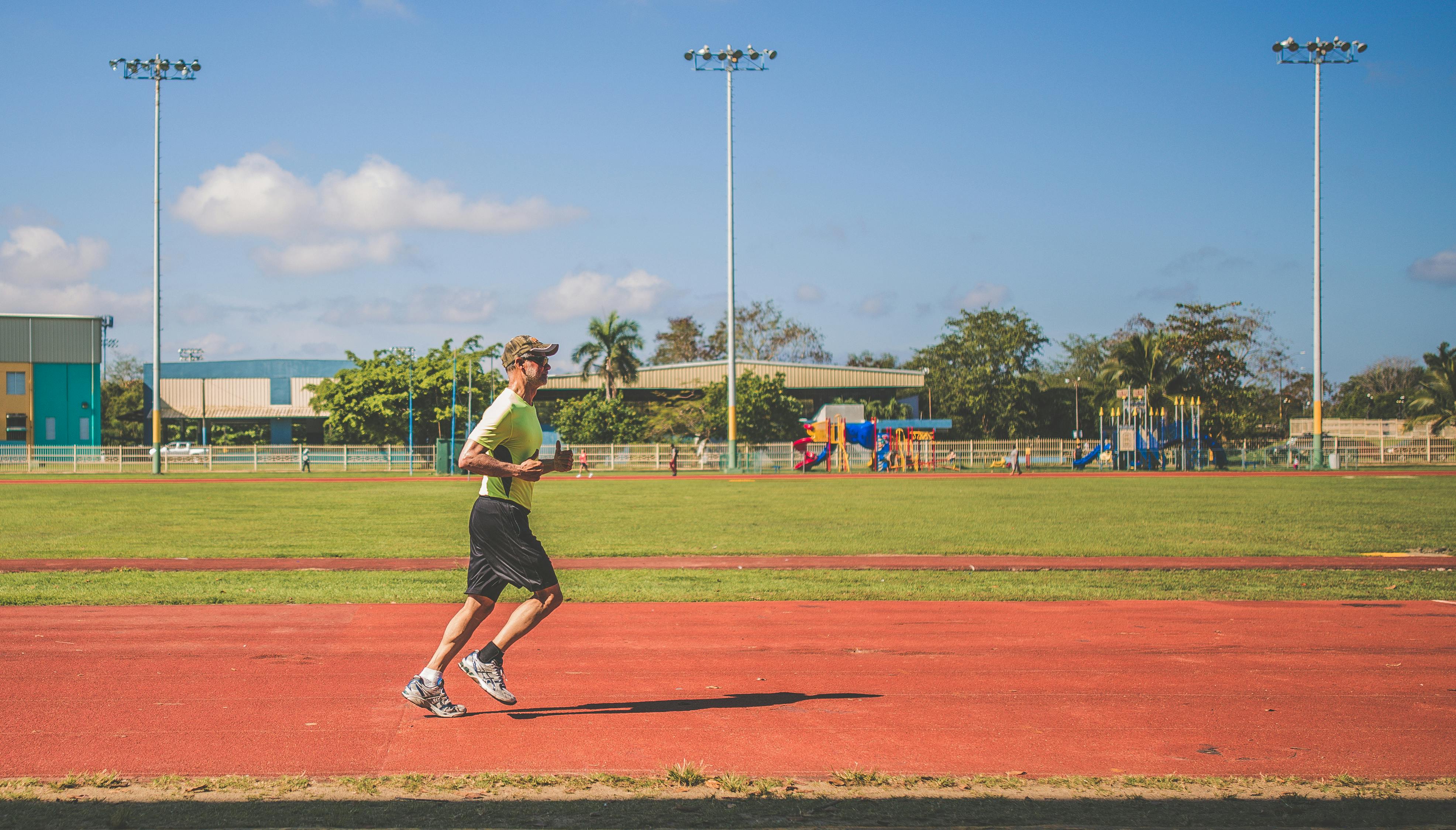 Man Running On A Field · Free Stock Photo