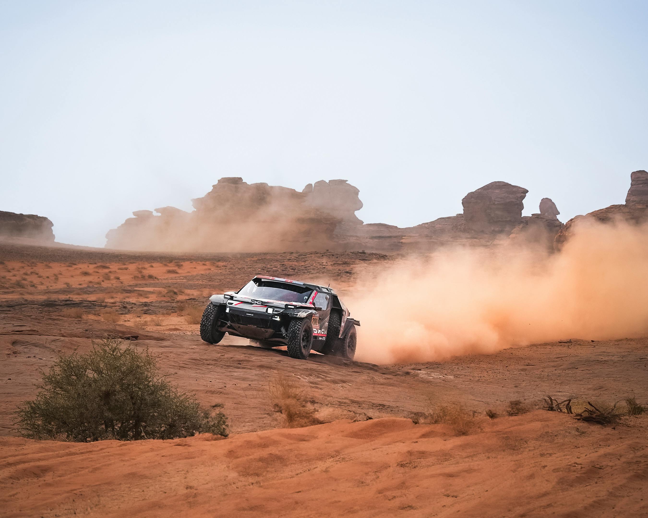 Off-road Rally Car Racing in Desert Terrain · Free Stock Photo